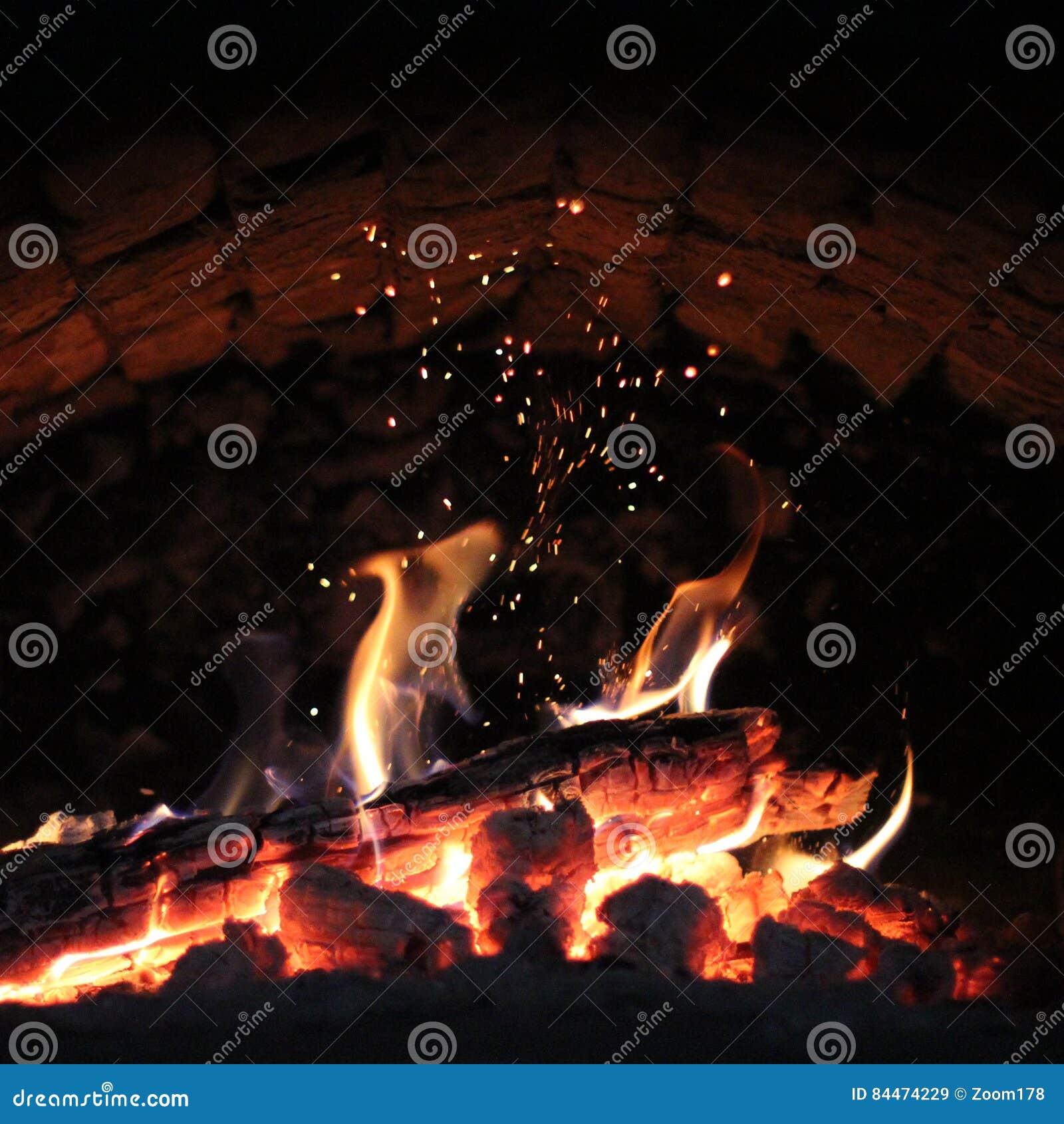 Magic fire in a fireplace stock image. Image of color - 84474229