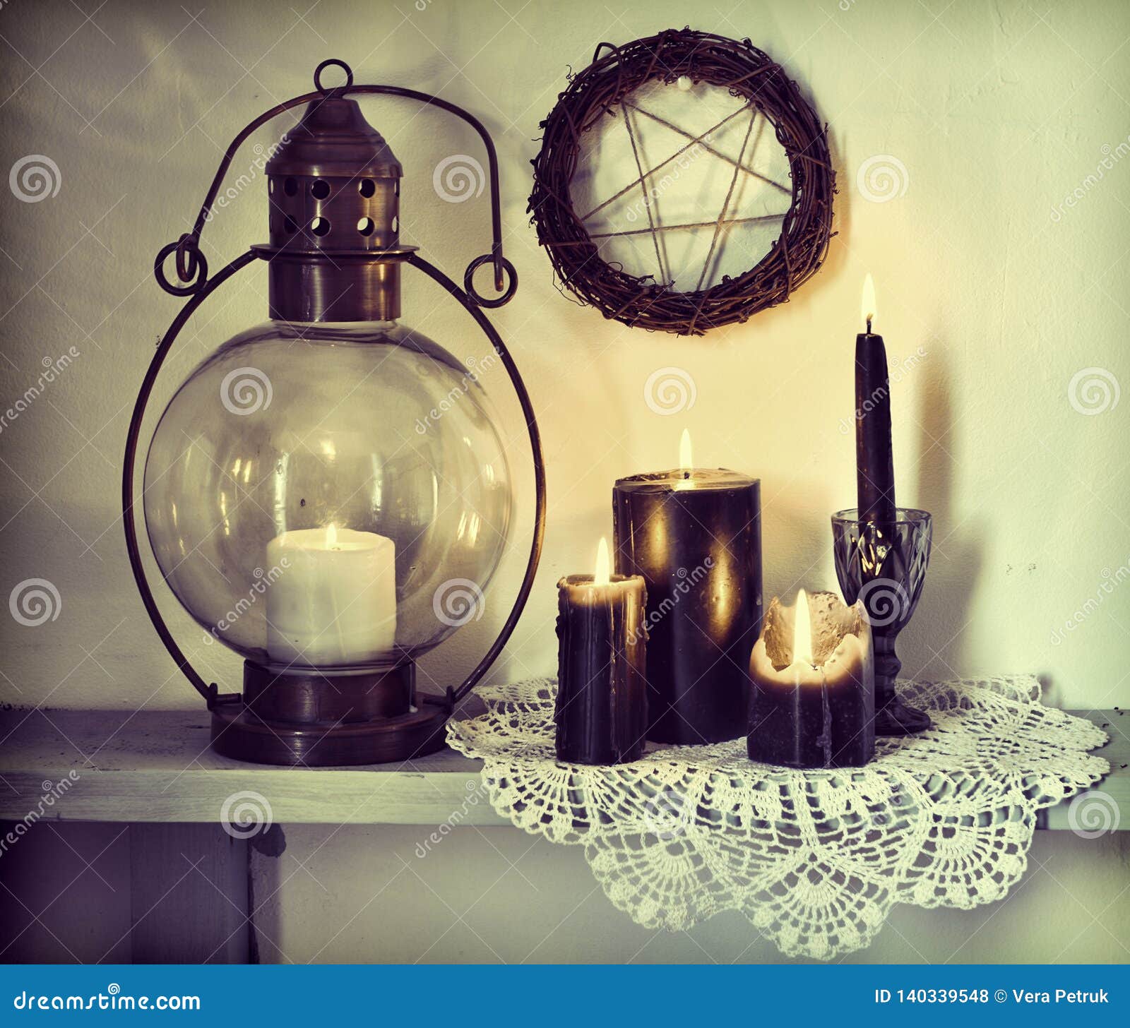 Burning Black Candles, Old-fashioned Lamp And Pentagram On Shelf With ...