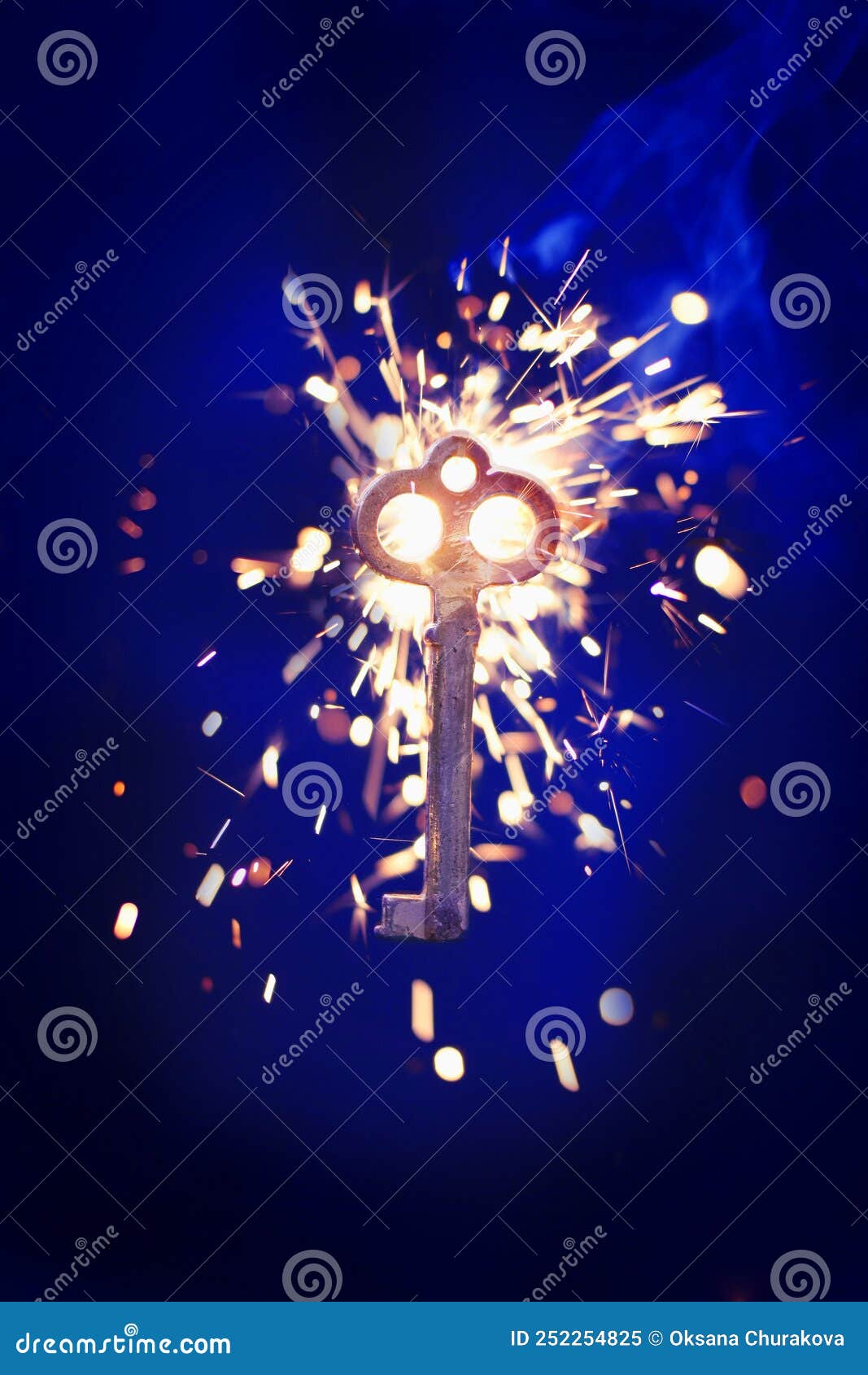 Magic Hot Burning Key with Sparkler on Dark Blue Background Stock Image ...