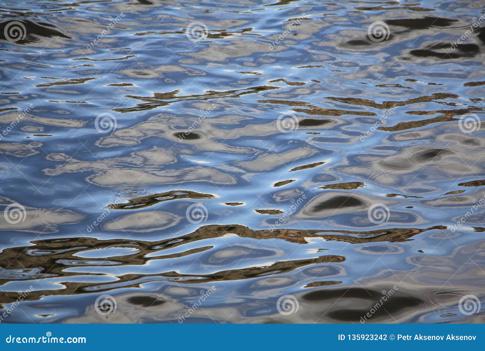 Magic Patterns on the Water. in a Moment Drawn Pattern Stock Photo ...