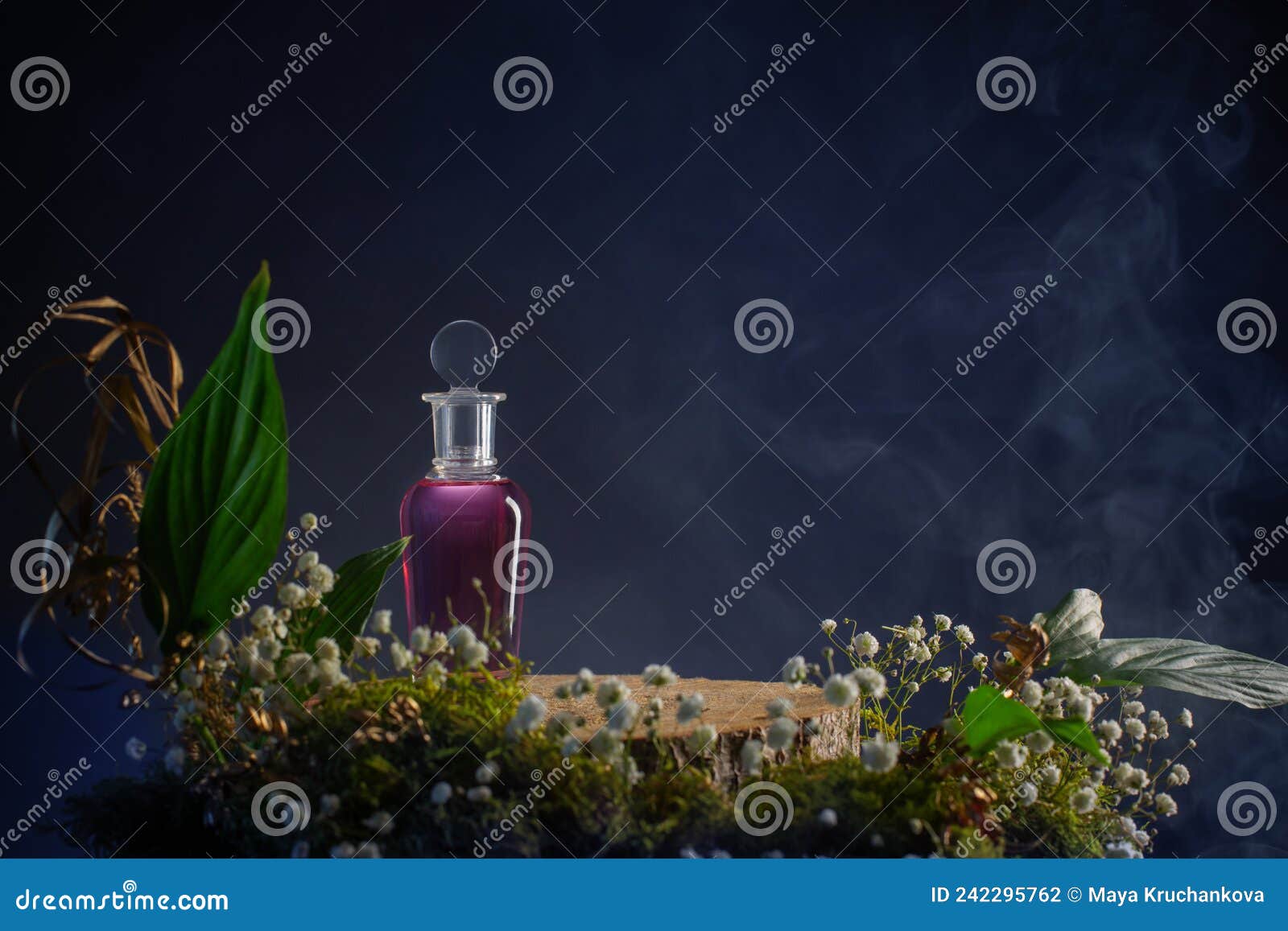 Magic Potion in Bottle with Plants and Flowers on Blue Background Stock ...