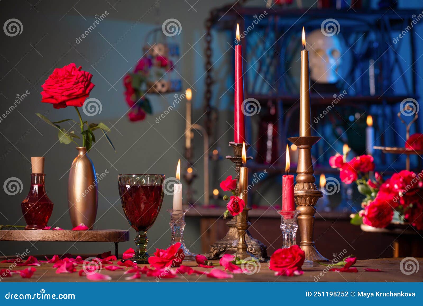 Magic Potion with Roses and Burning Candles in Dark Room Stock Photo ...