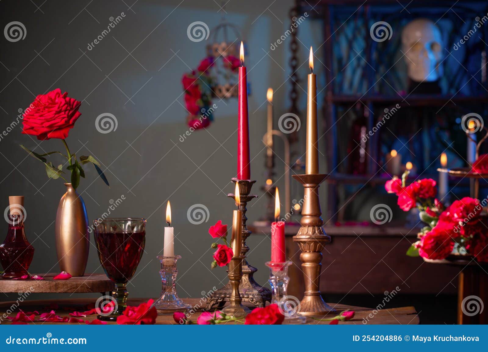 Magic Potion with Red Roses and Burning Candles in Dark Room Stock ...