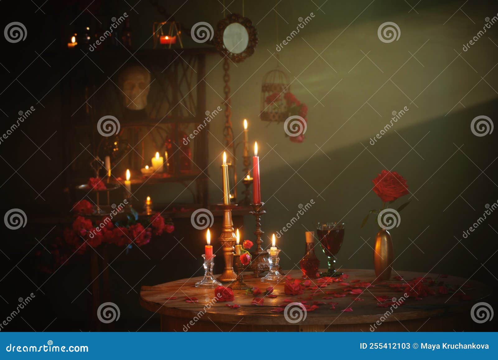 Potion with Red Roses and Burning Candles in Dark Room Stock Image ...