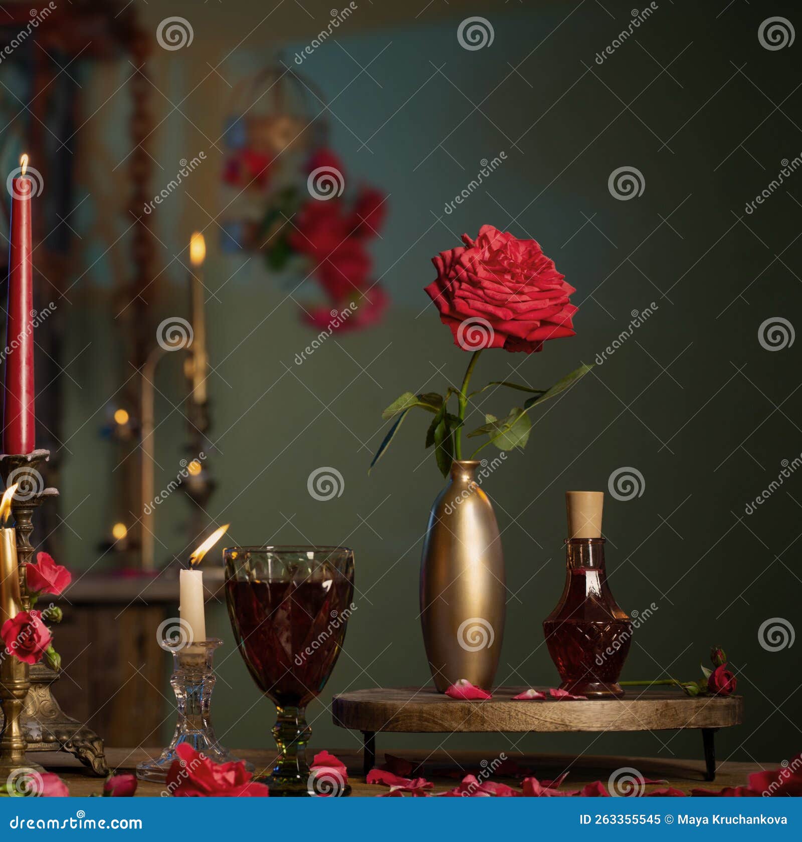 Magic Potion with Roses and Burning Candles in Dark Room Stock Image ...