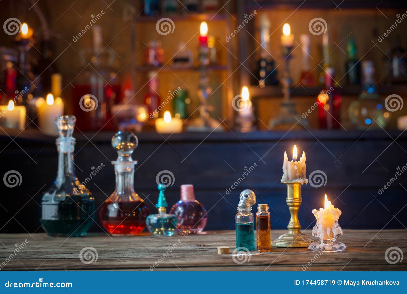 Magic Potions in Bottles on Wooden Table Stock Image - Image of potions ...