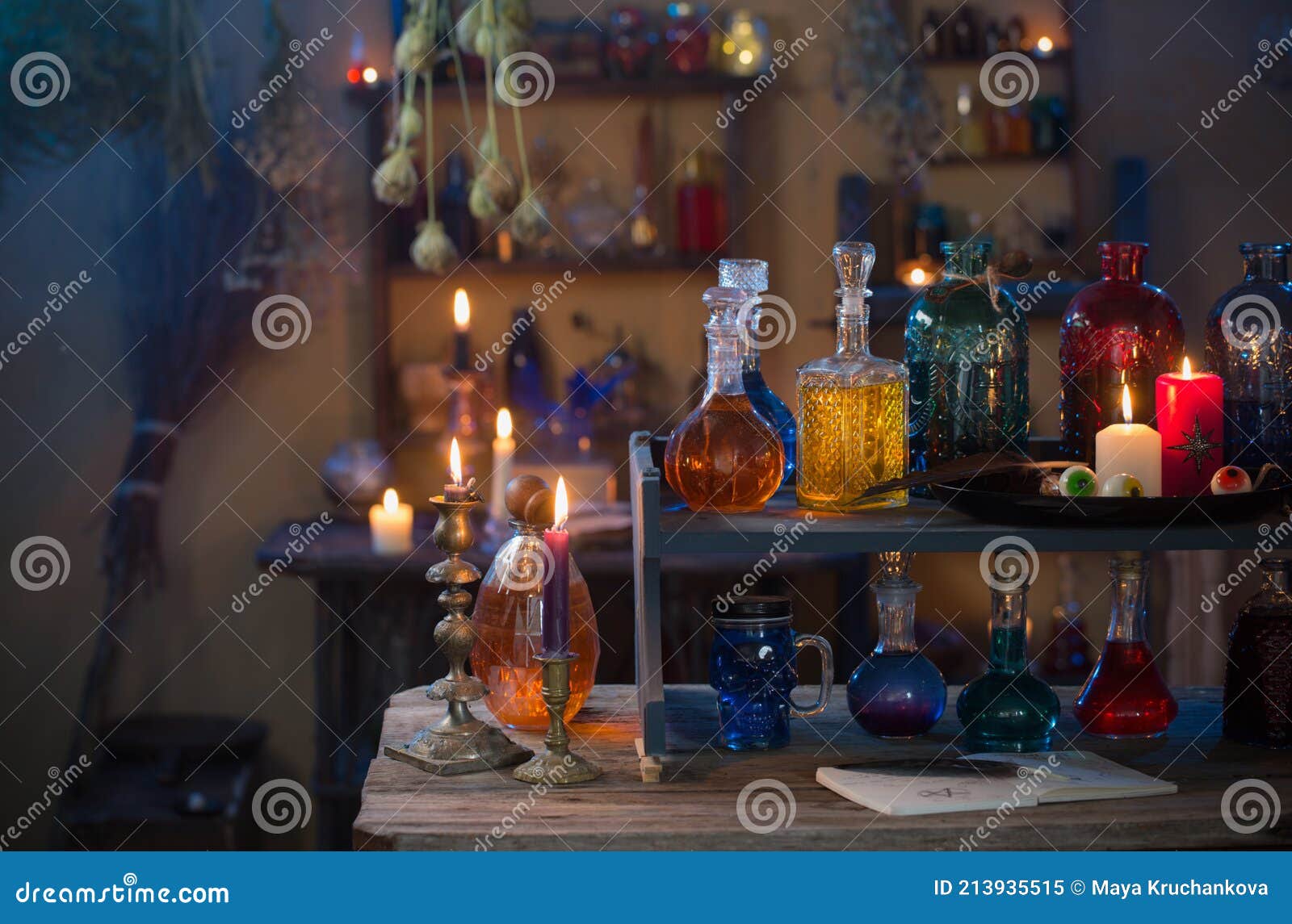 Magic Potions in Witch`s House with Burning Candles at Night Stock ...