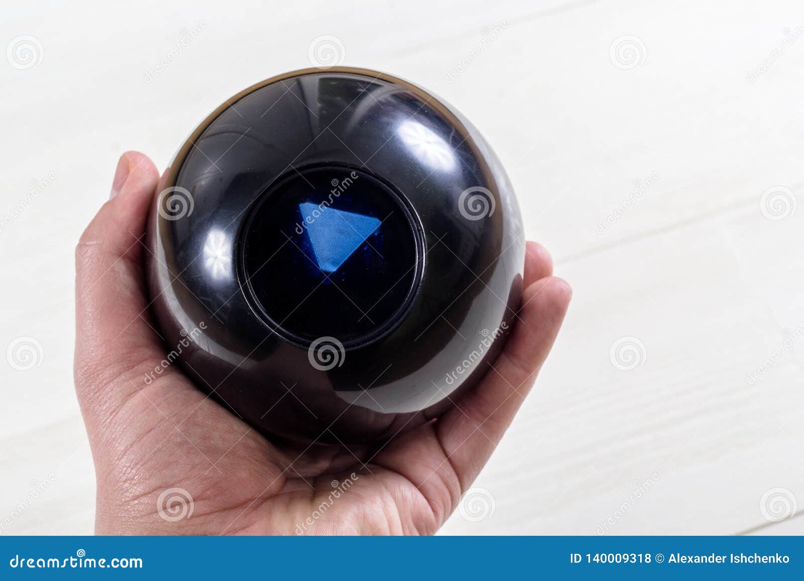 Magic Prediction Eight Ball in Hand Stock Photo - Image of play, number ...