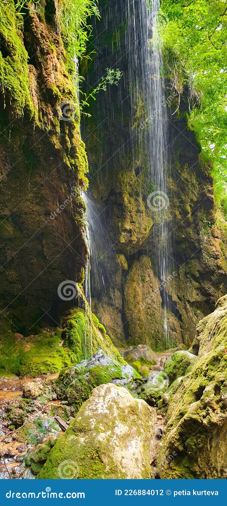Magic waterfall and cave stock photo. Image of river - 226884012