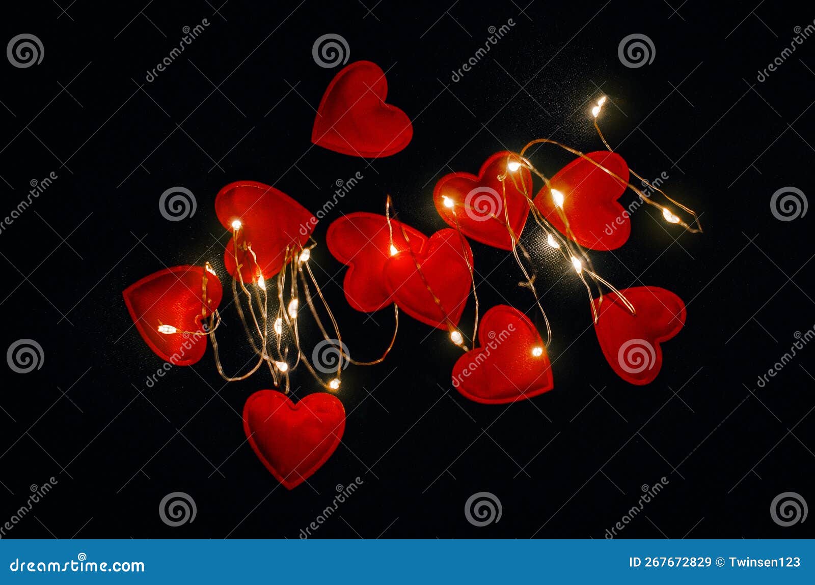 The Magical Glow of Red Hearts on Black Fabric. View from Above Stock ...