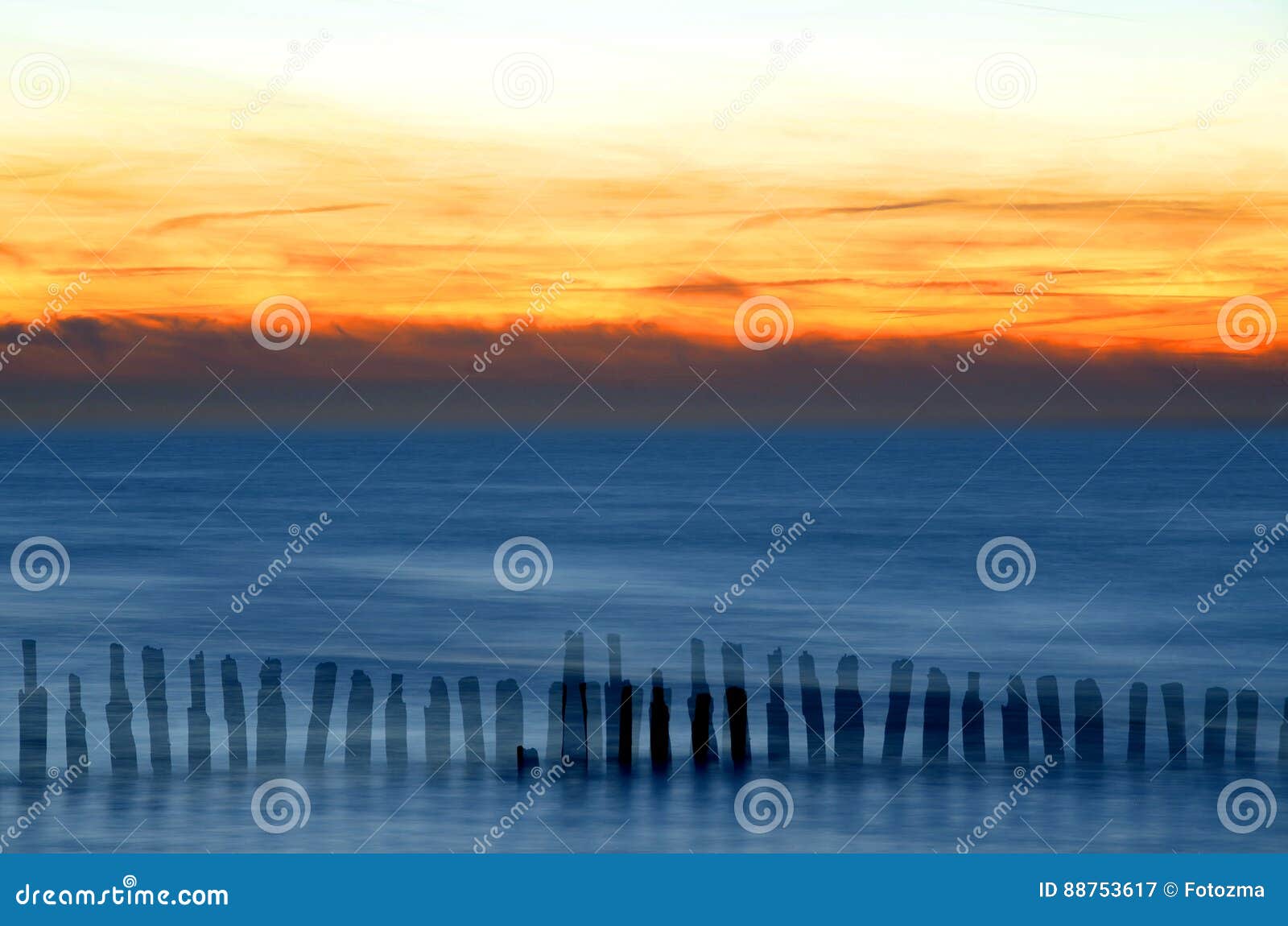 Magical Sunset Over the Sea Stock Image - Image of layers, breakwater ...
