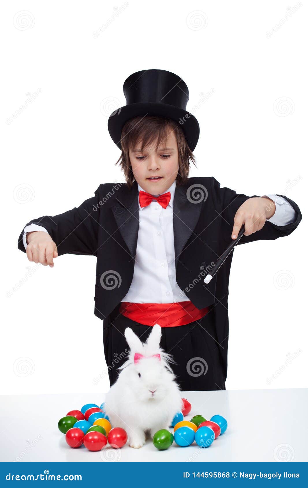 Magician Boy Perform a Magic Trick with the Easter Bunny and Some ...