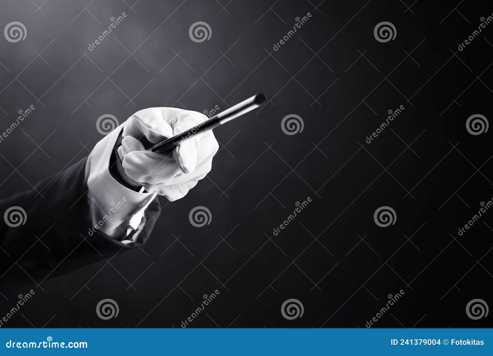 Magician Hand Holding Magic Wand on Dark Backgrounds Stock Photo ...