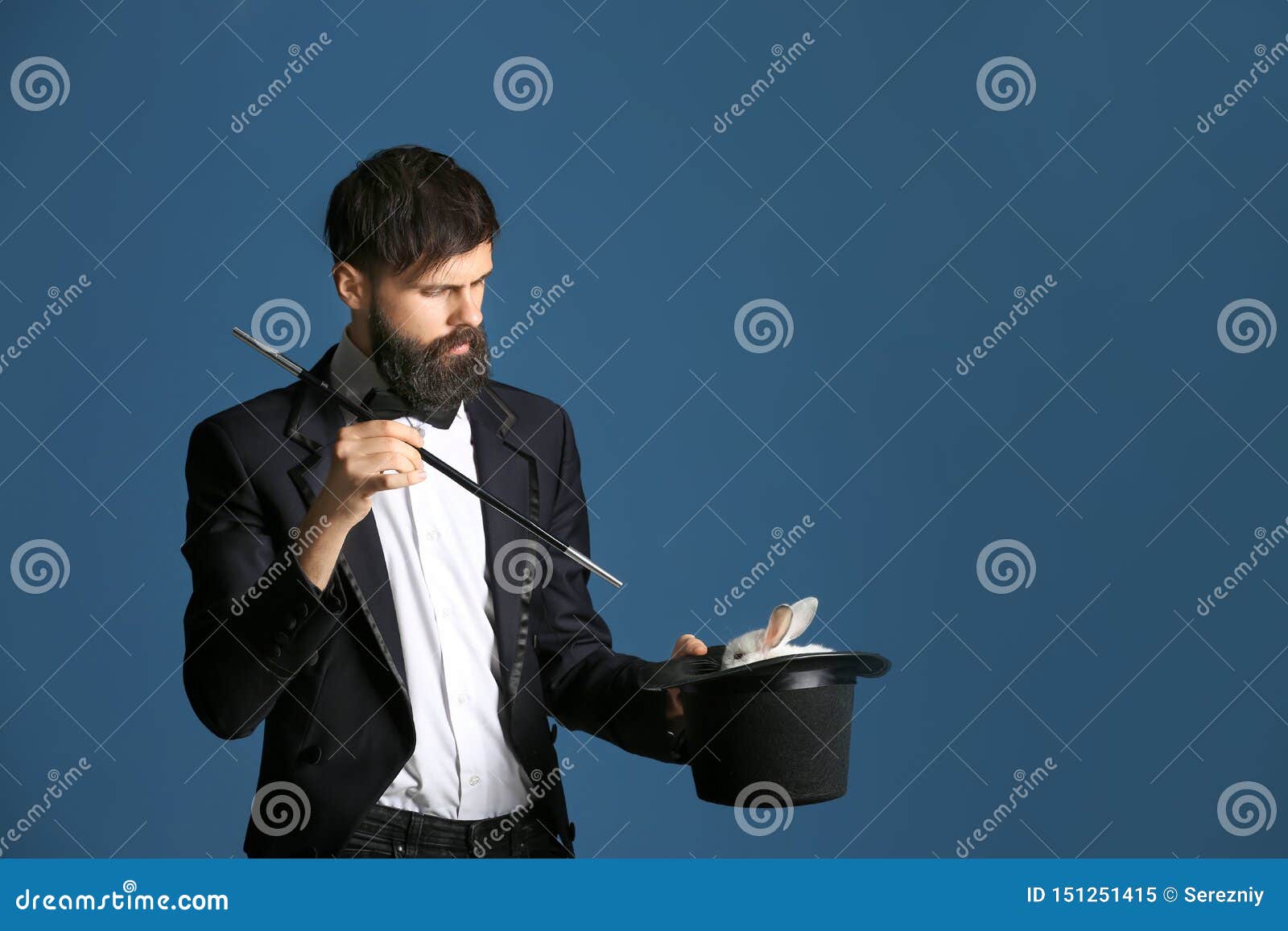 Magician Holding Hat with Rabbit on Color Background Stock Image ...