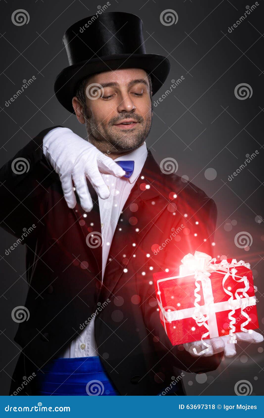 Magician with magic gift stock photo. Image of festive - 63697318