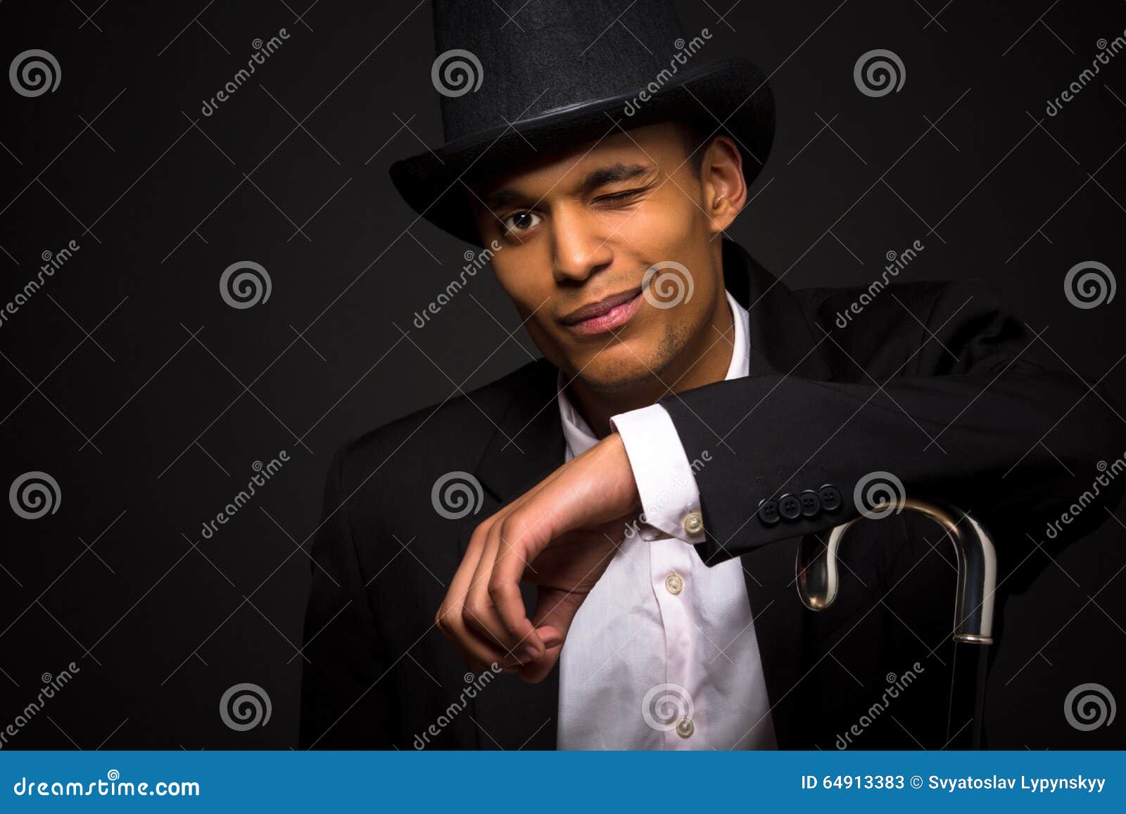 Magician man winking stock image. Image of cheerful, studio - 64913383