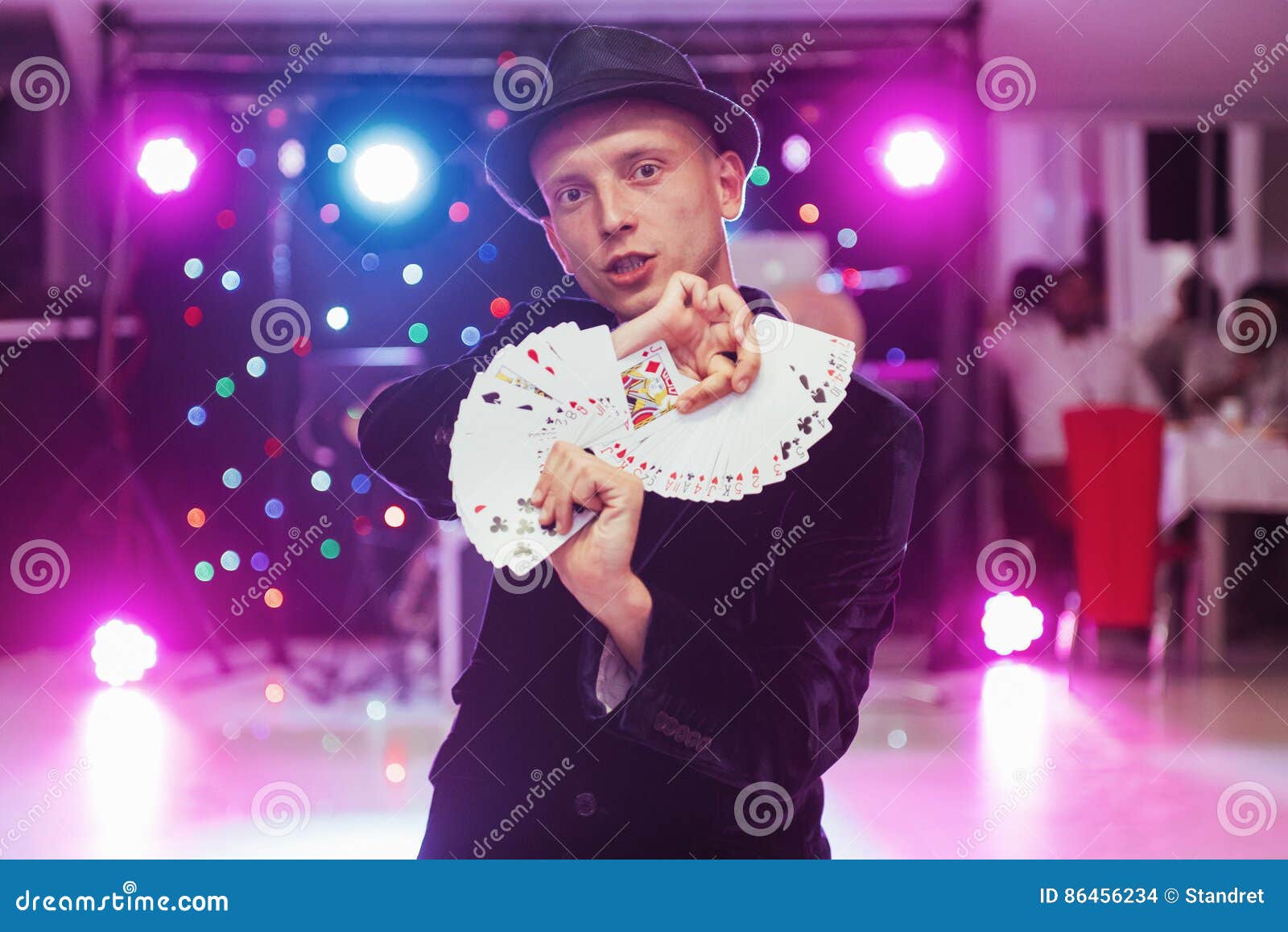 Magician Showing Trick with Playing Cards. Magic, Circus Stock Photo ...