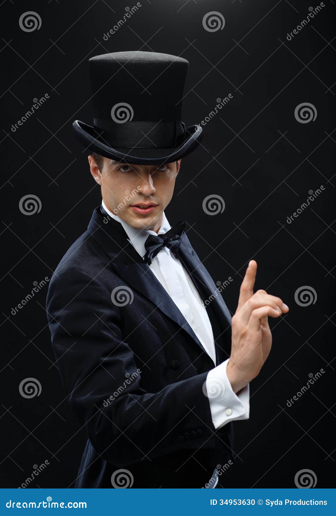 Magician in Top Hat Showing Trick Stock Photo - Image of black, dark ...