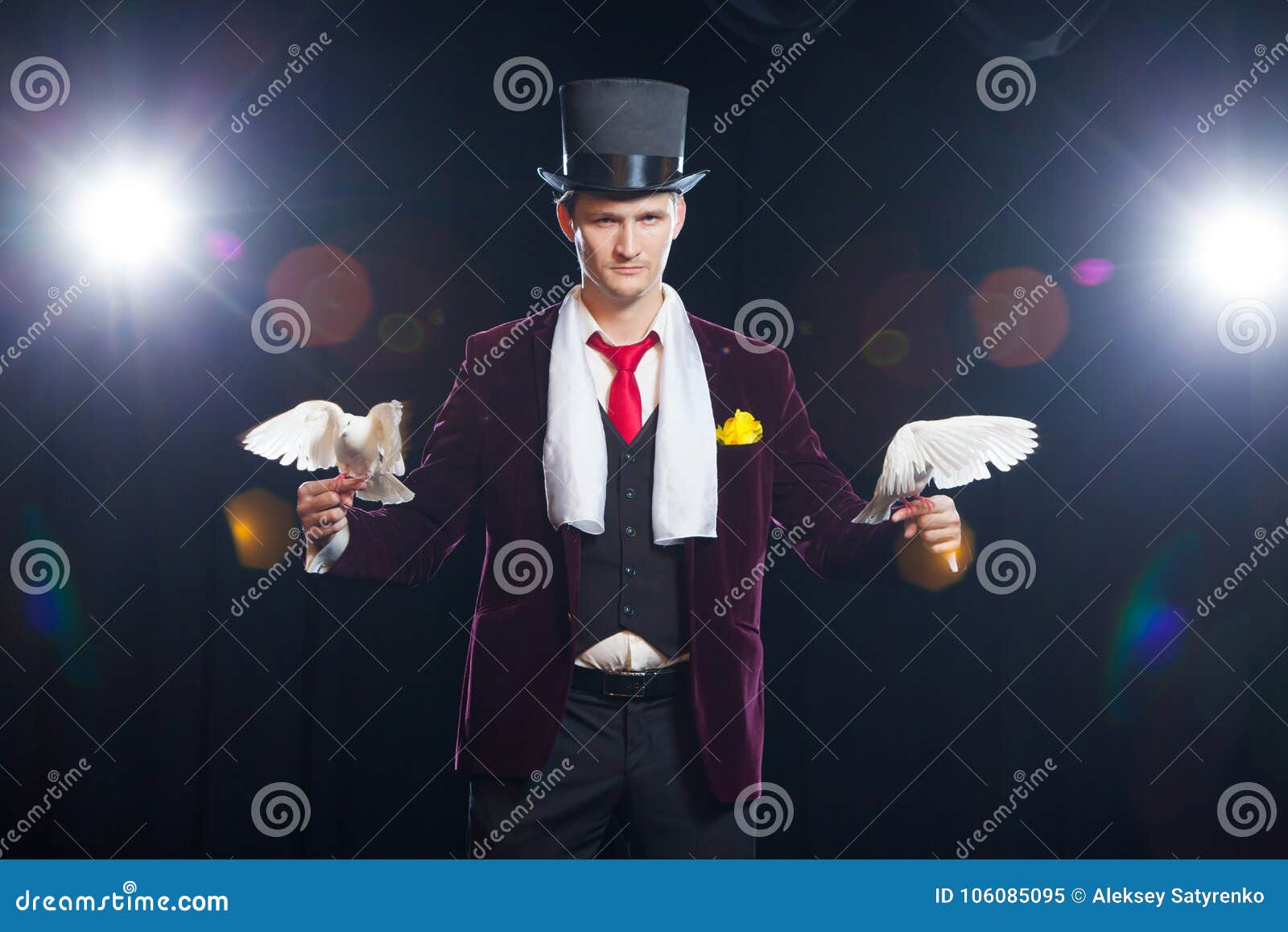 The Magician with a Two Flying White Doves. on a Black Background Stock ...