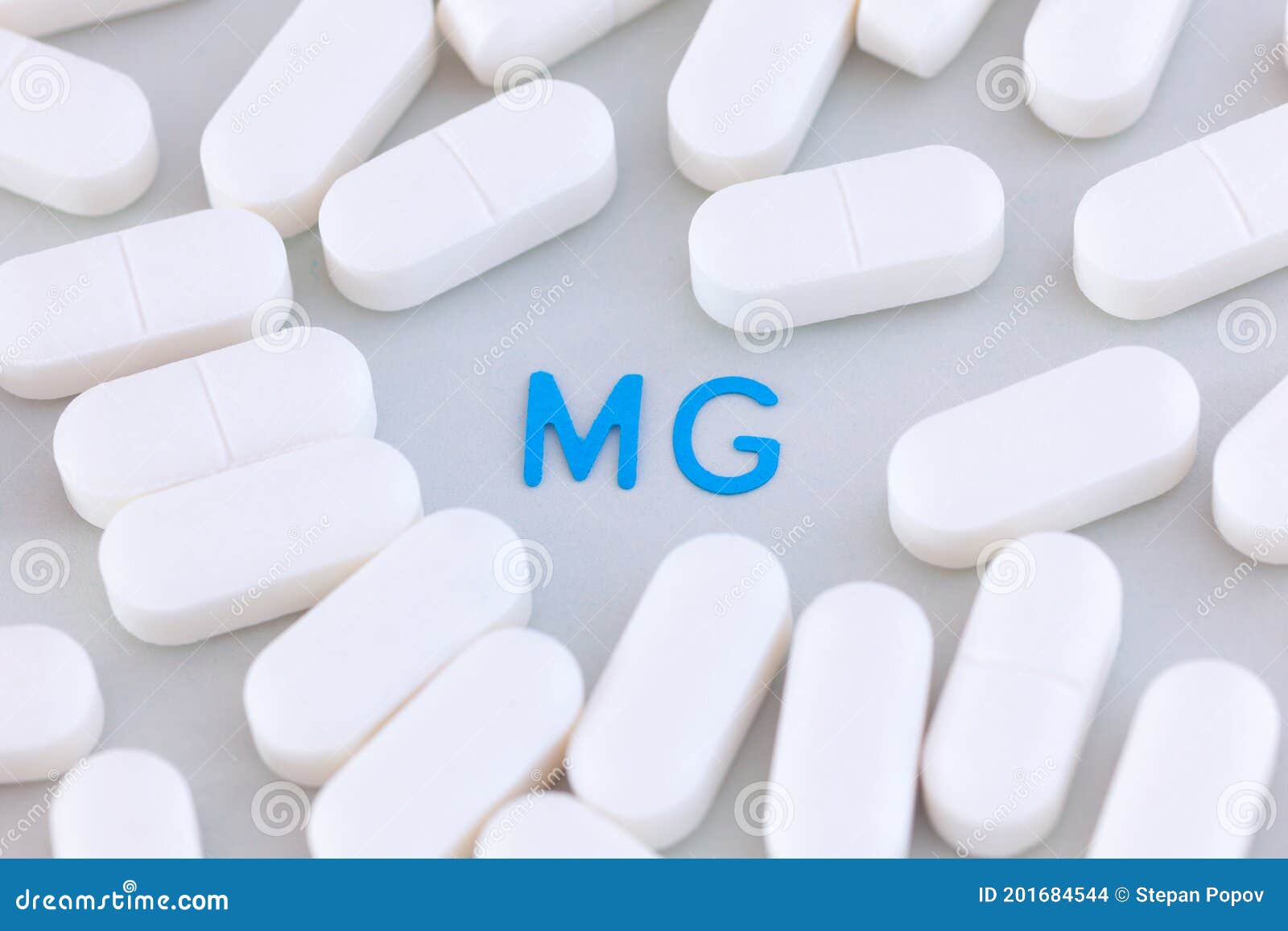 Magnesium Tablets Around the Symbol Mg Stock Photo - Image of pill ...