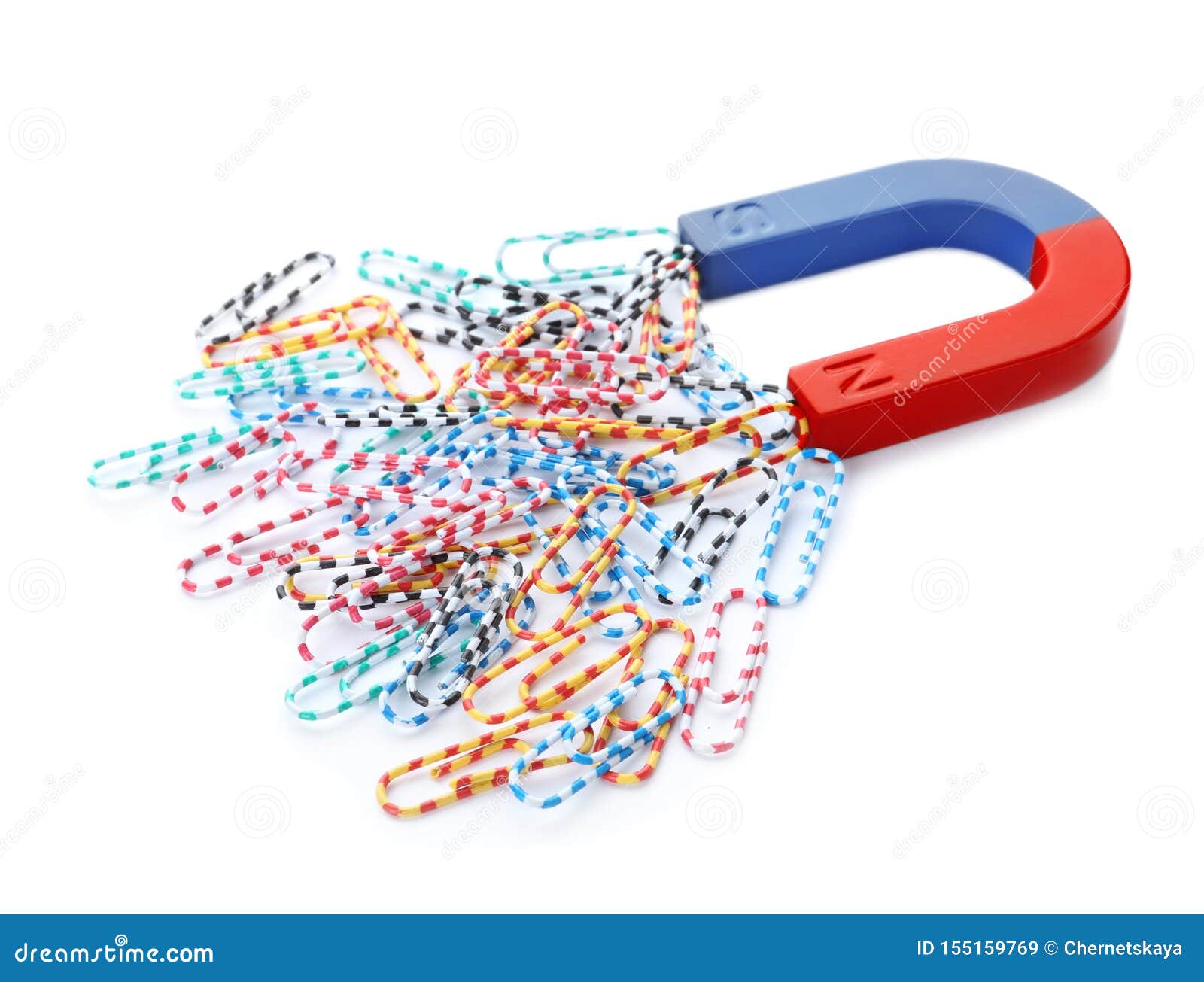 Magnet Attracting Paper Clips on White Stock Image - Image of magnetic ...