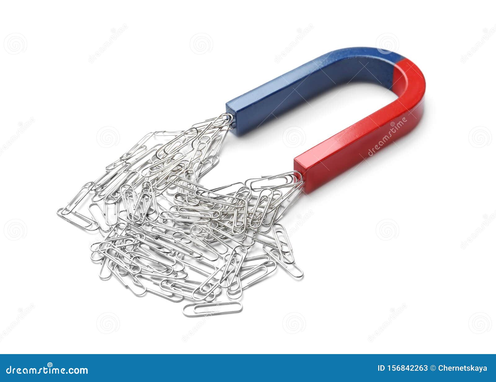 Magnet Attracting Paper Clips on White Stock Image - Image of metal ...