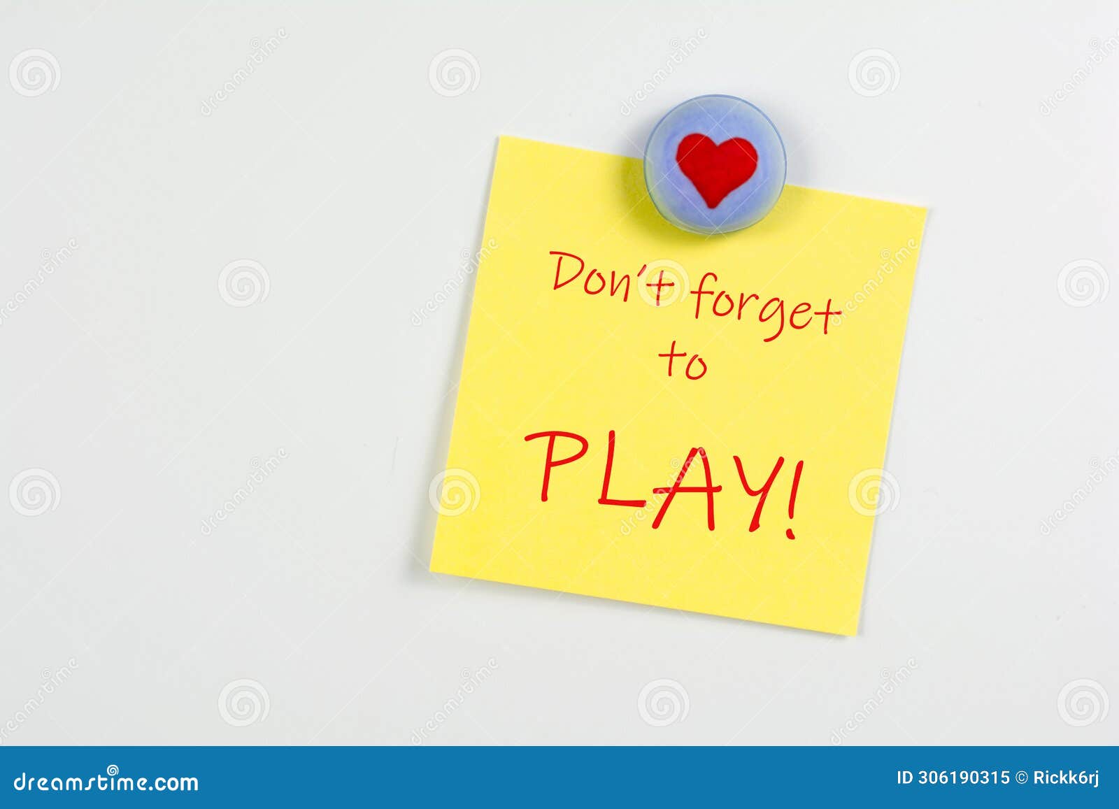 Magnet and Yellow Sticky Note Reminder To Play on Refrigerator Stock ...