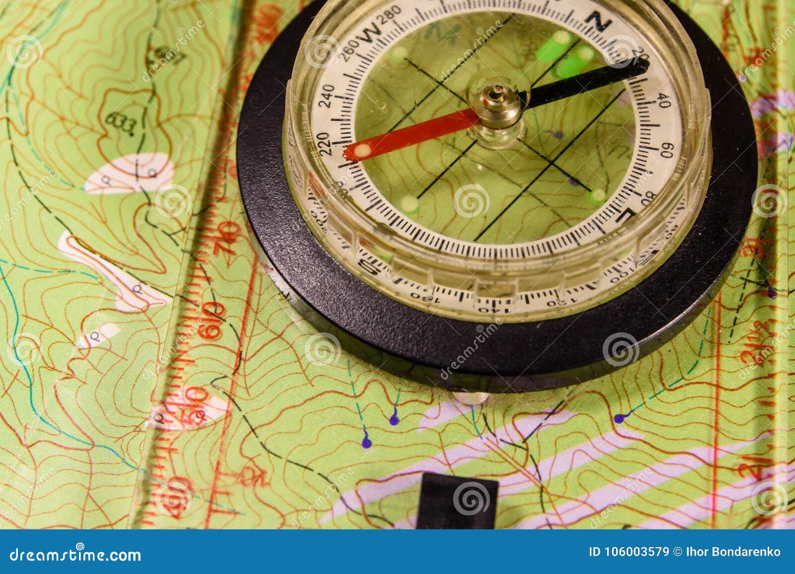 Magnetic Compass Lying on Topographical Map Stock Image - Image of ...