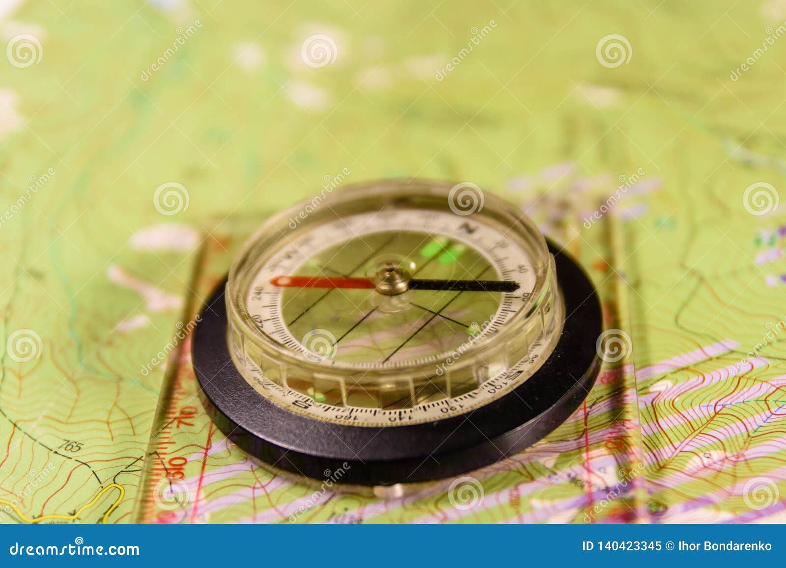 Magnetic Compass Lying on Topographical Map Stock Image - Image of aged ...