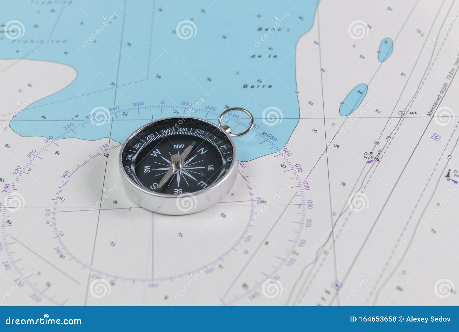 Magnetic Compass on a Nautical Navigational Map Stock Photo - Image of ...
