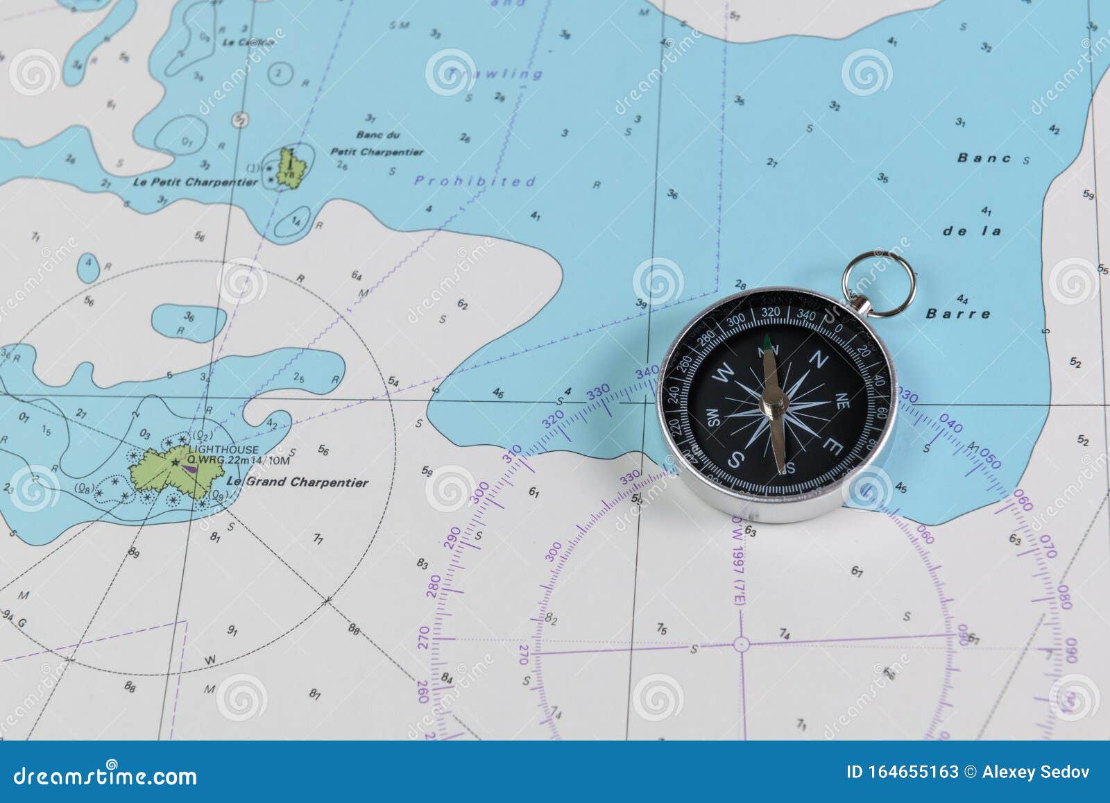 Magnetic Compass on a Nautical Navigational Map Stock Image - Image of ...