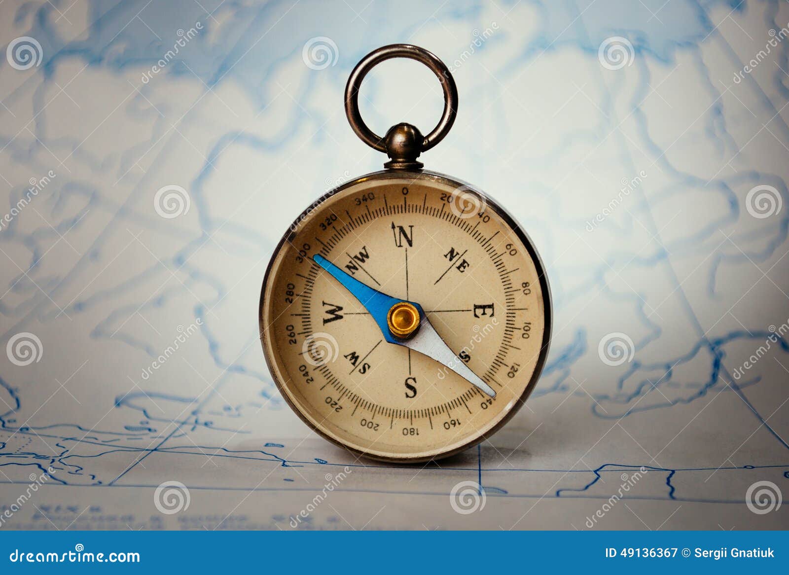 Magnetic Compass Standing Upright on a Map Stock Image - Image of west ...