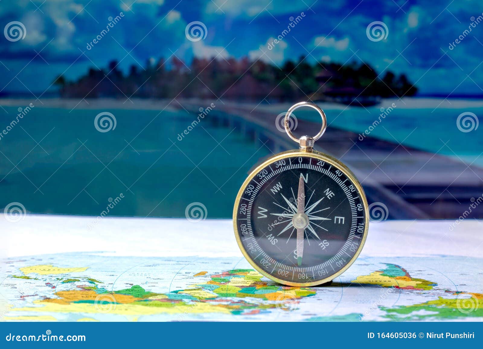 Magnetic Compass on a World Map Conceptual Stock Photo - Image of ...