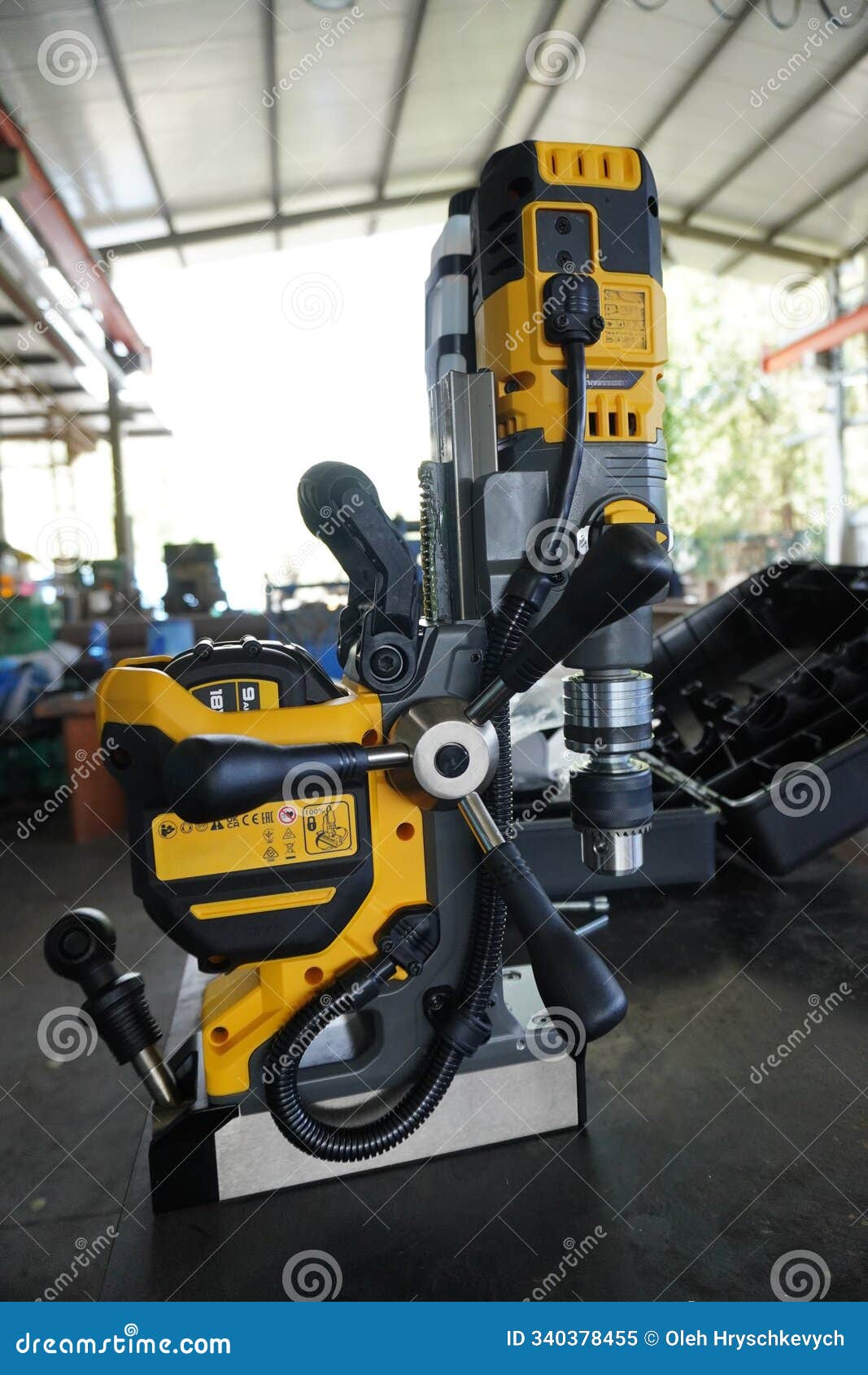 Magnetic Industrial Drill. For Drilling A Hole In A Metal Sheet. Using ...