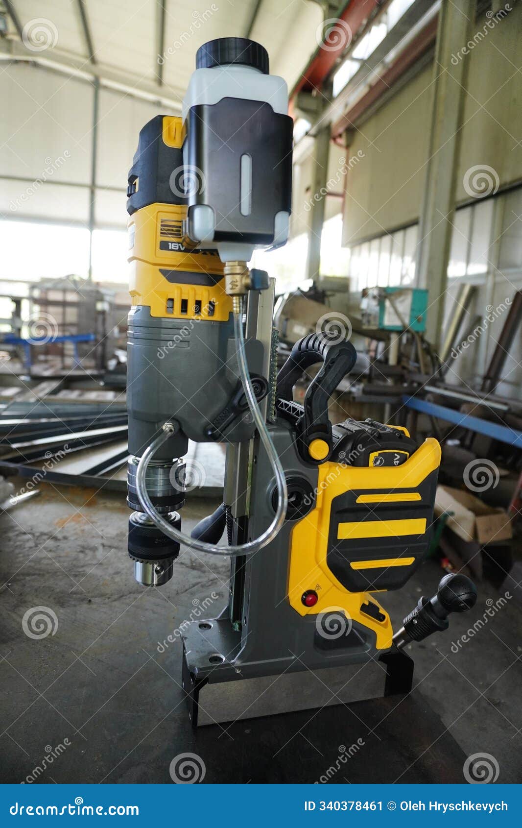 Magnetic Industrial Drill. For Drilling A Hole In A Metal Sheet. Using ...