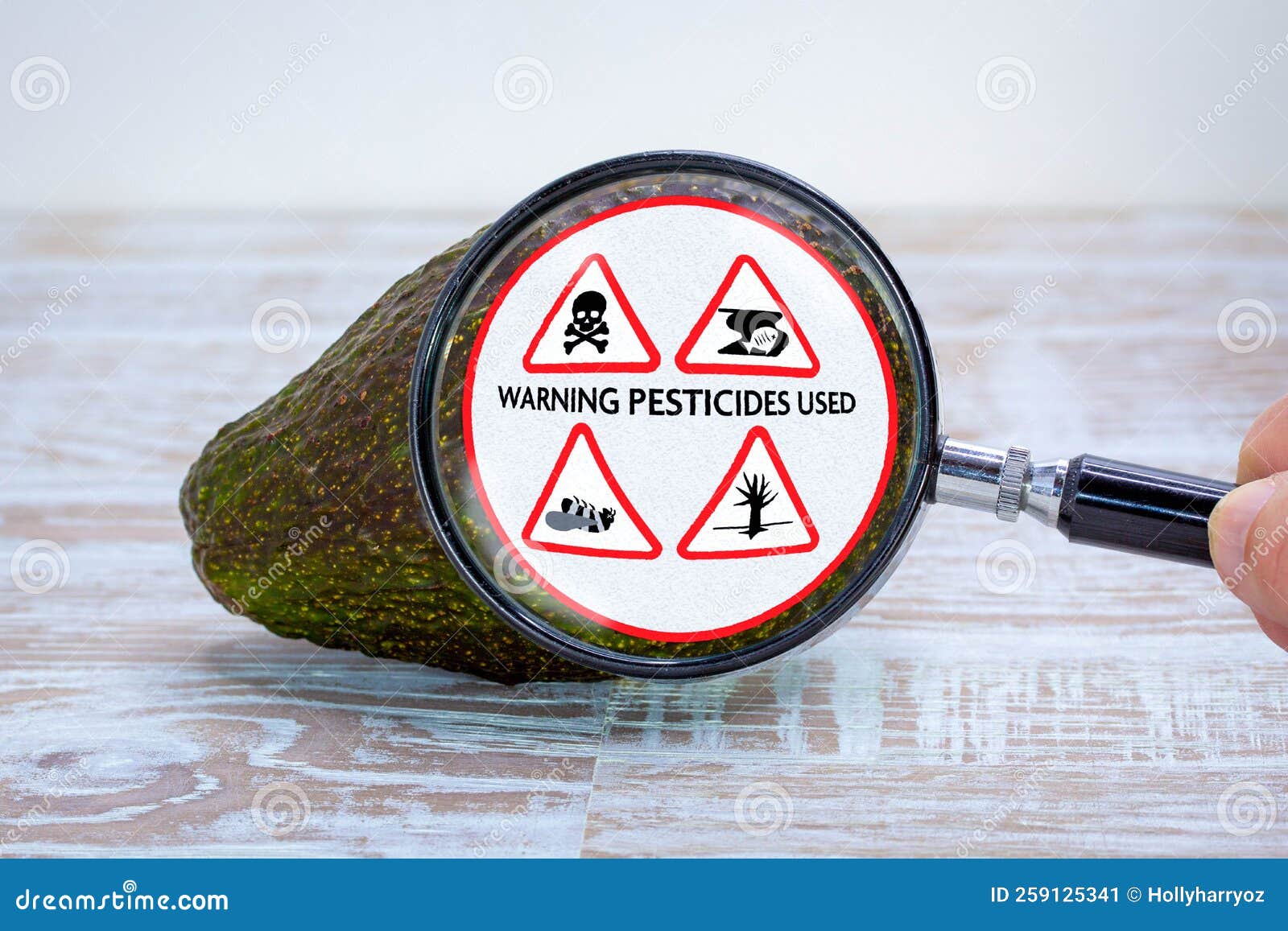 Magnified Label on Avocado, Warning of Environmental Damage Caused by ... Magnified Label on Avocado, Warning of Environmental Damage Caused by ...