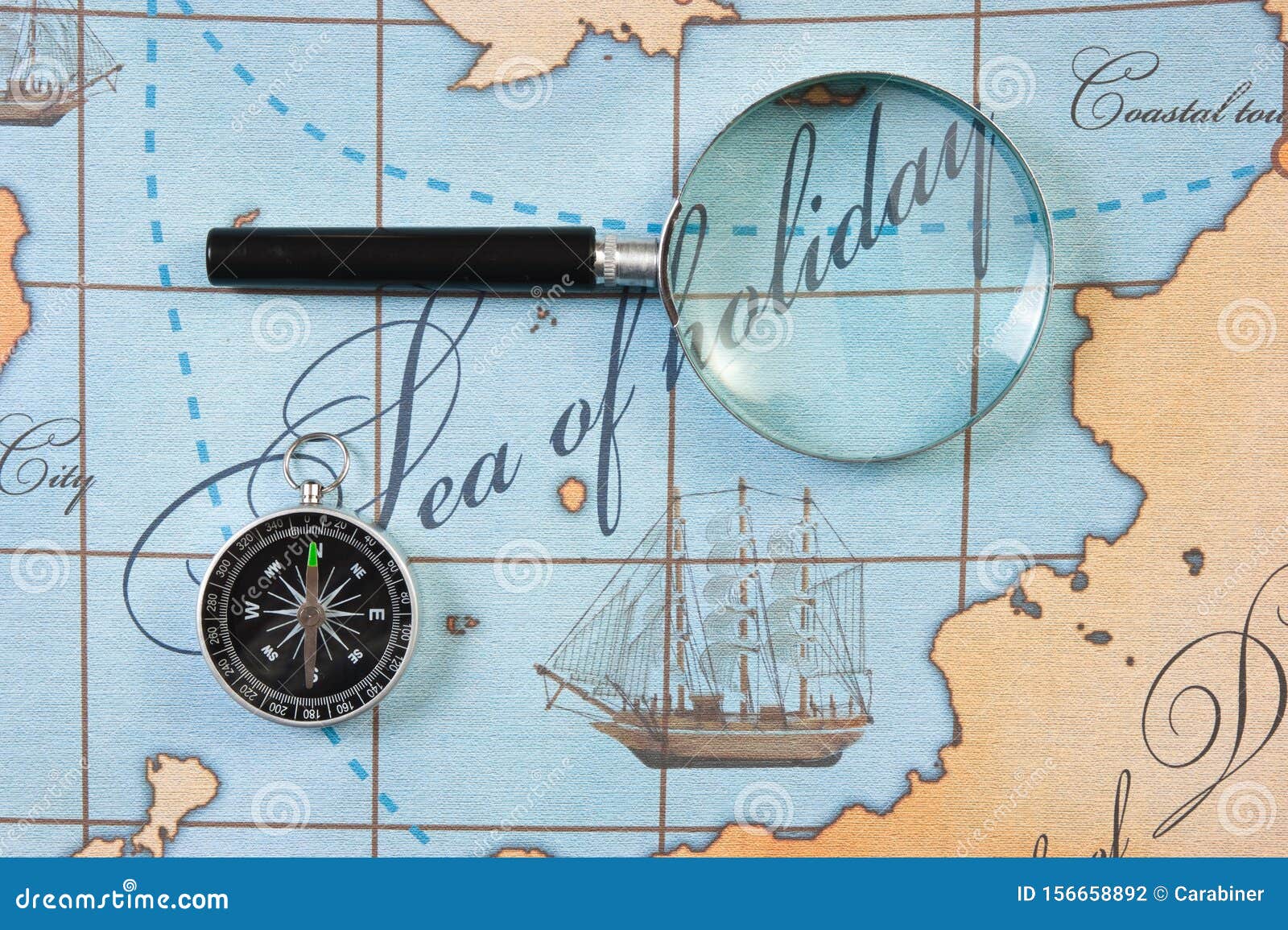 Magnifier and Compass on Map Stock Photo - Image of north, magnifier ...