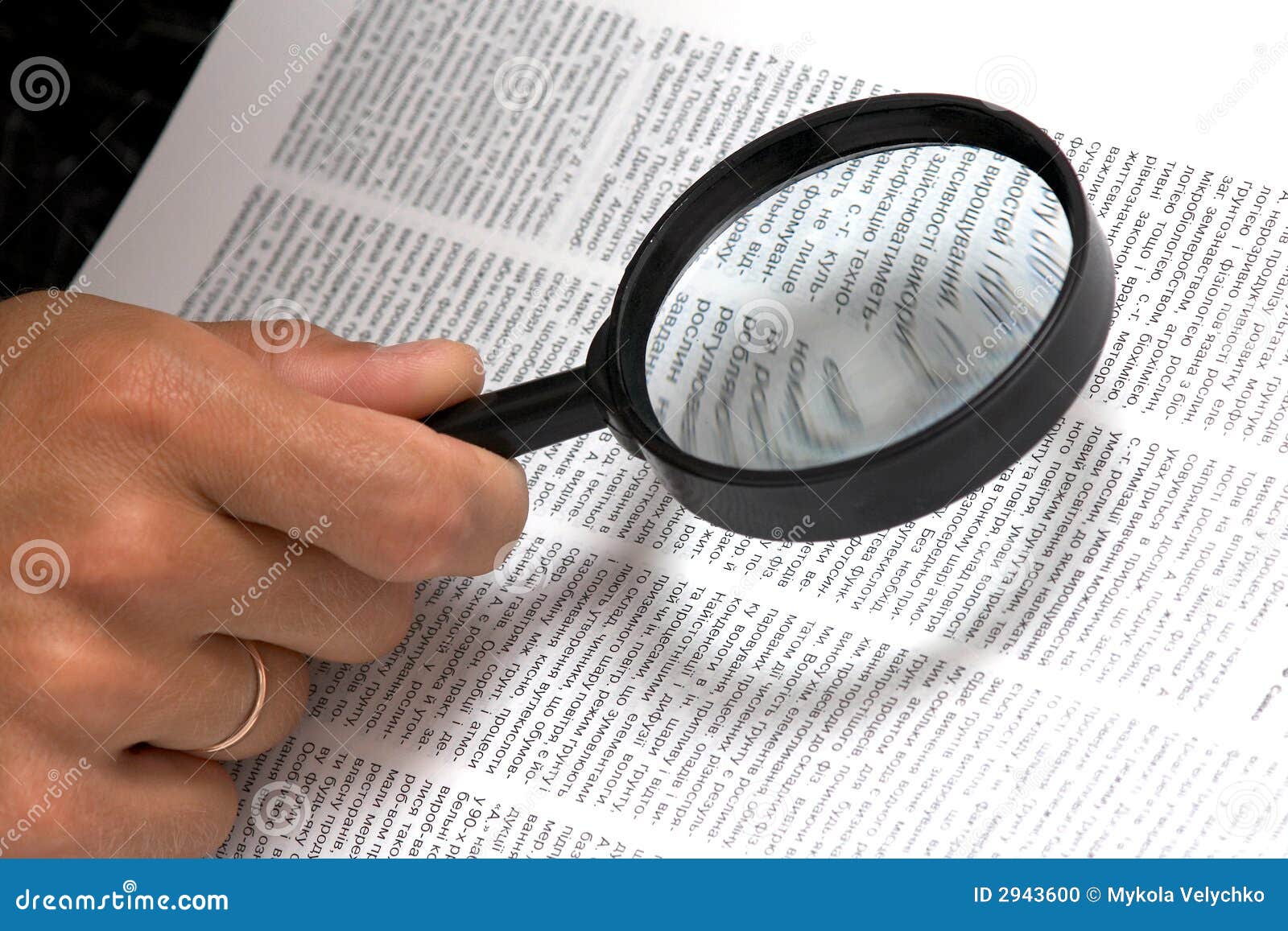 Magnifier in hand stock photo. Image of literature, glasses - 2943600