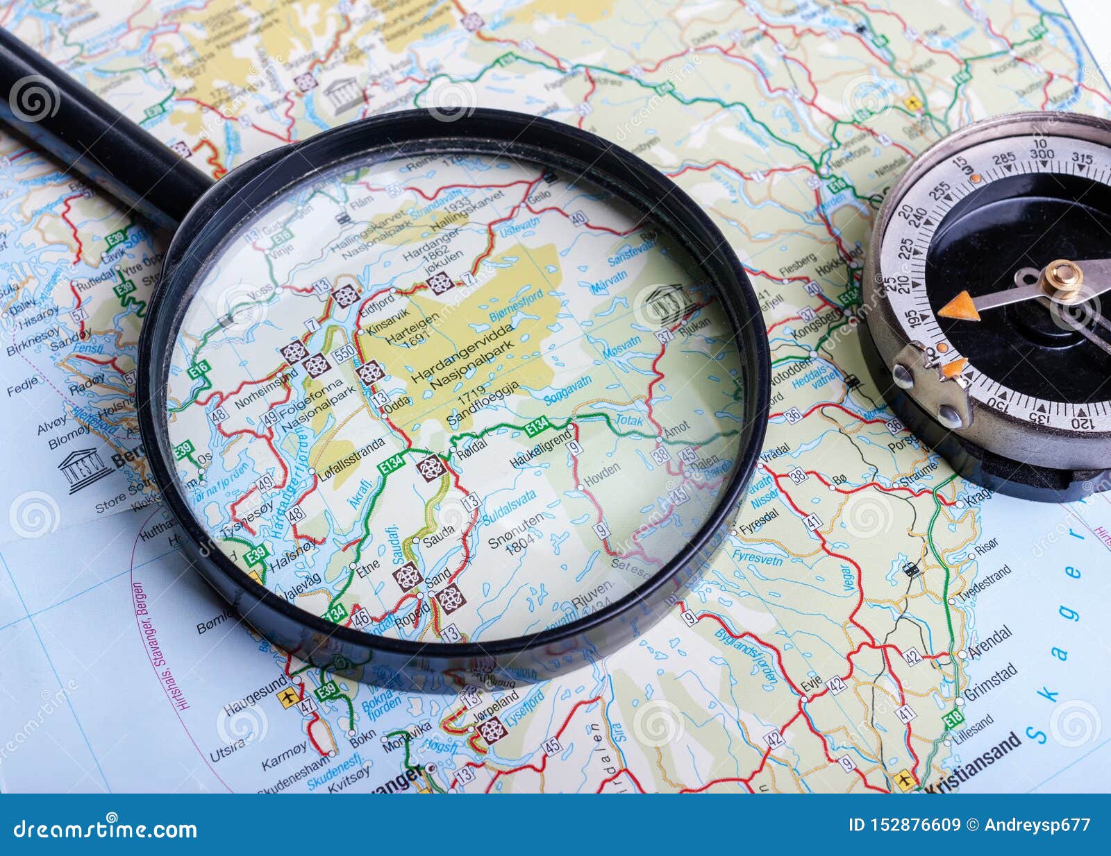 Magnifier on the Map and Compass Stock Image - Image of compass, city ...