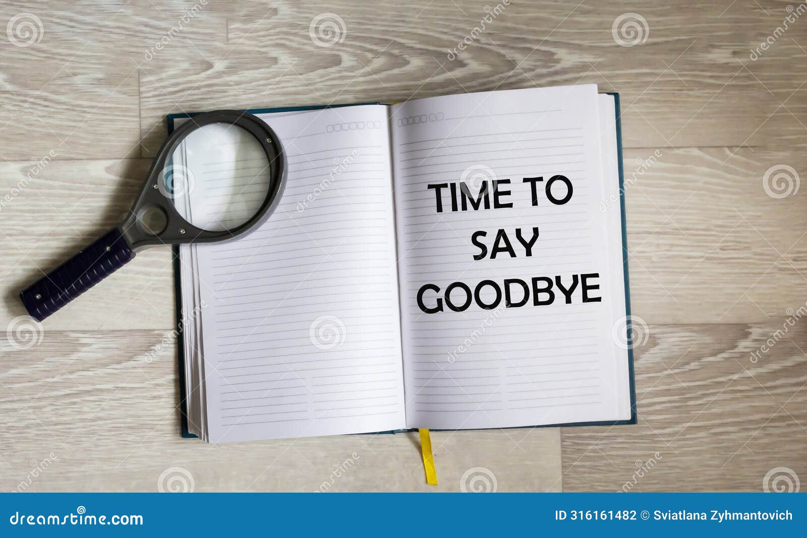 Magnifier and Phrase Time To Say Goodbye Written on a Notepad, Top View ...