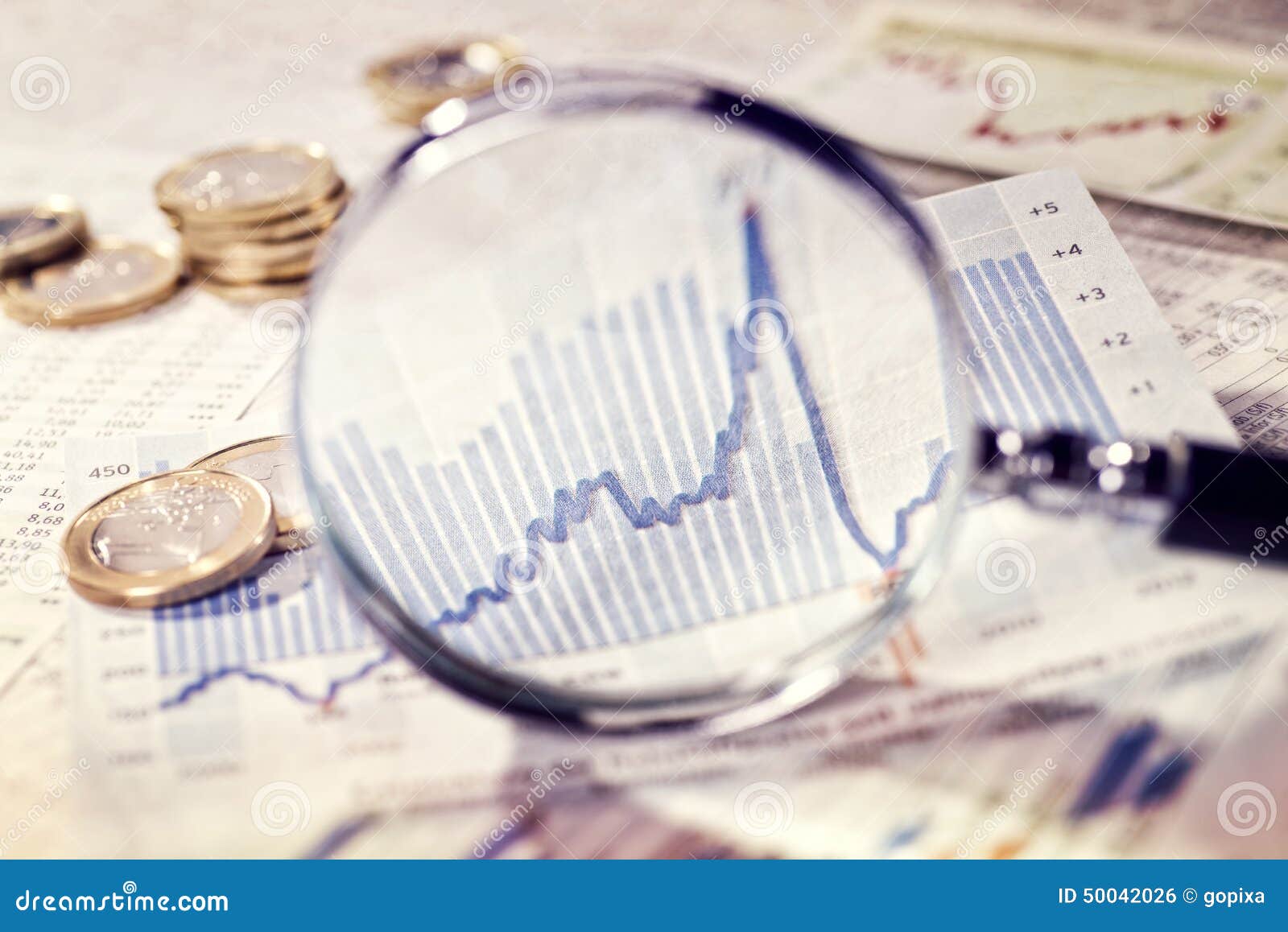 Magnifier Shows the Evolution of the Market Stock Photo - Image of ...