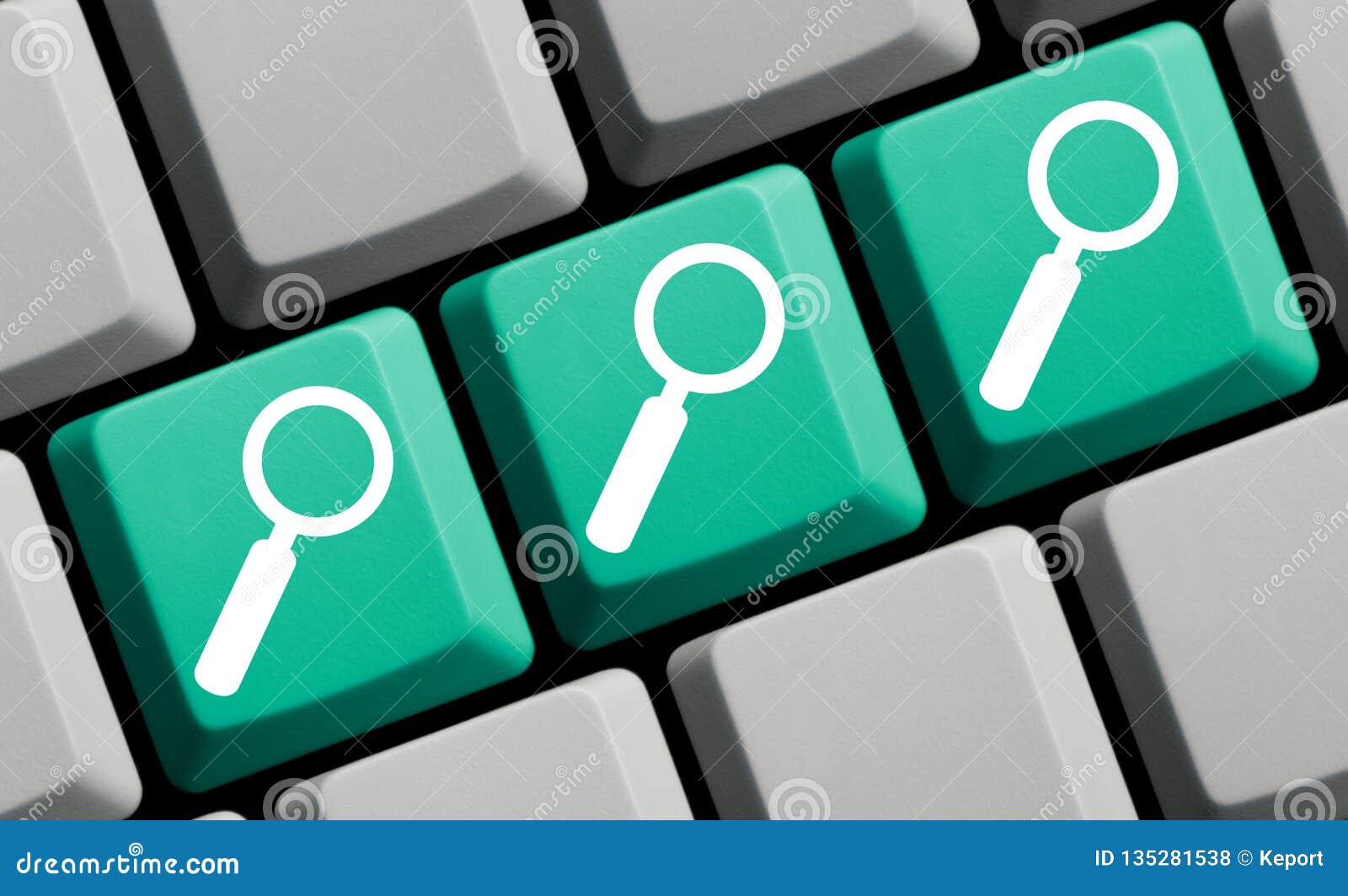 3 Magnify Symbols on Blue Green Computer Keyboard Stock Photo - Image ...