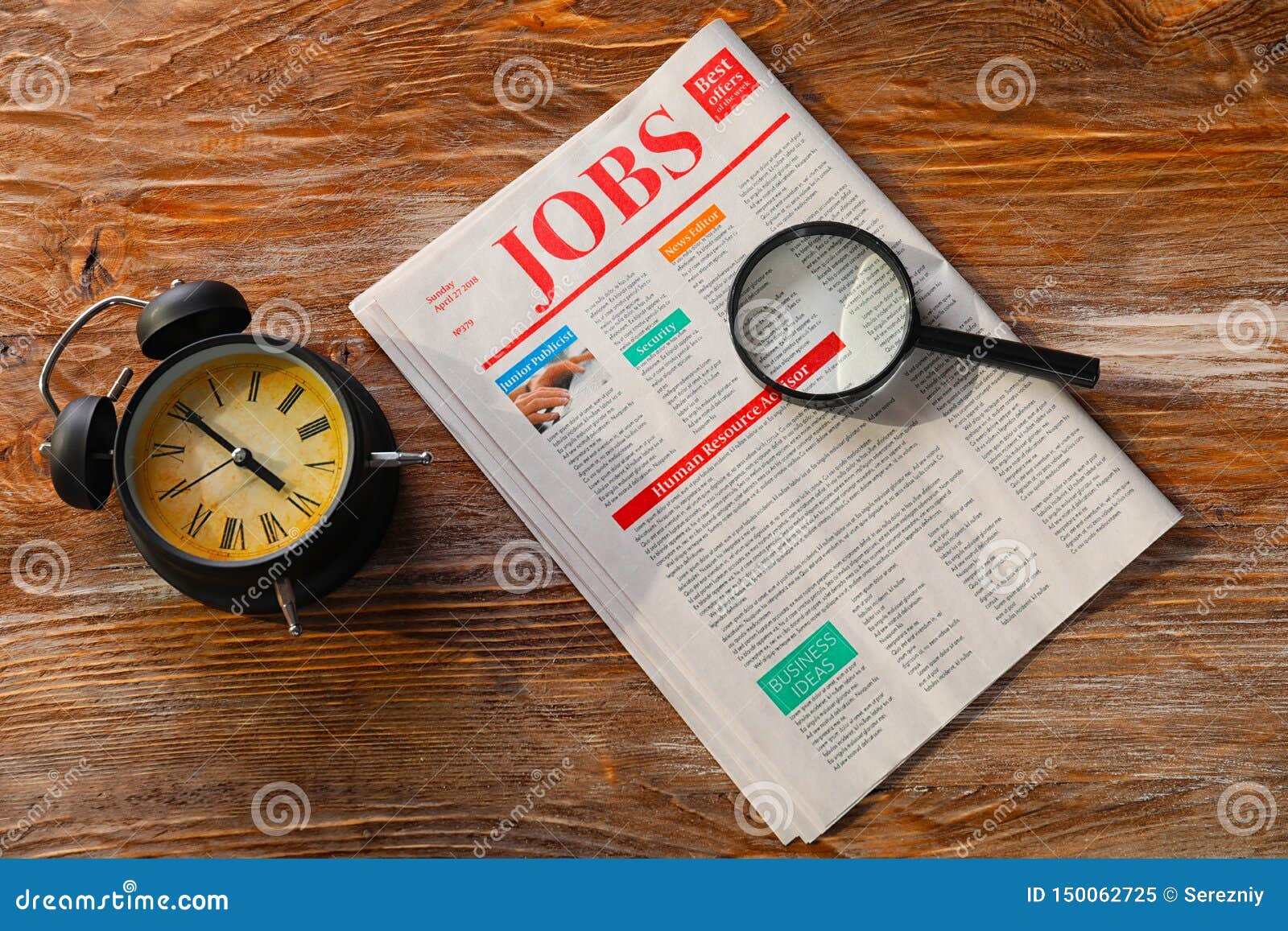 Magnifying Glass with Alarm Clock and Newspaper on Wooden Background ... Magnifying Glass with Alarm Clock and Newspaper on Wooden Background ...