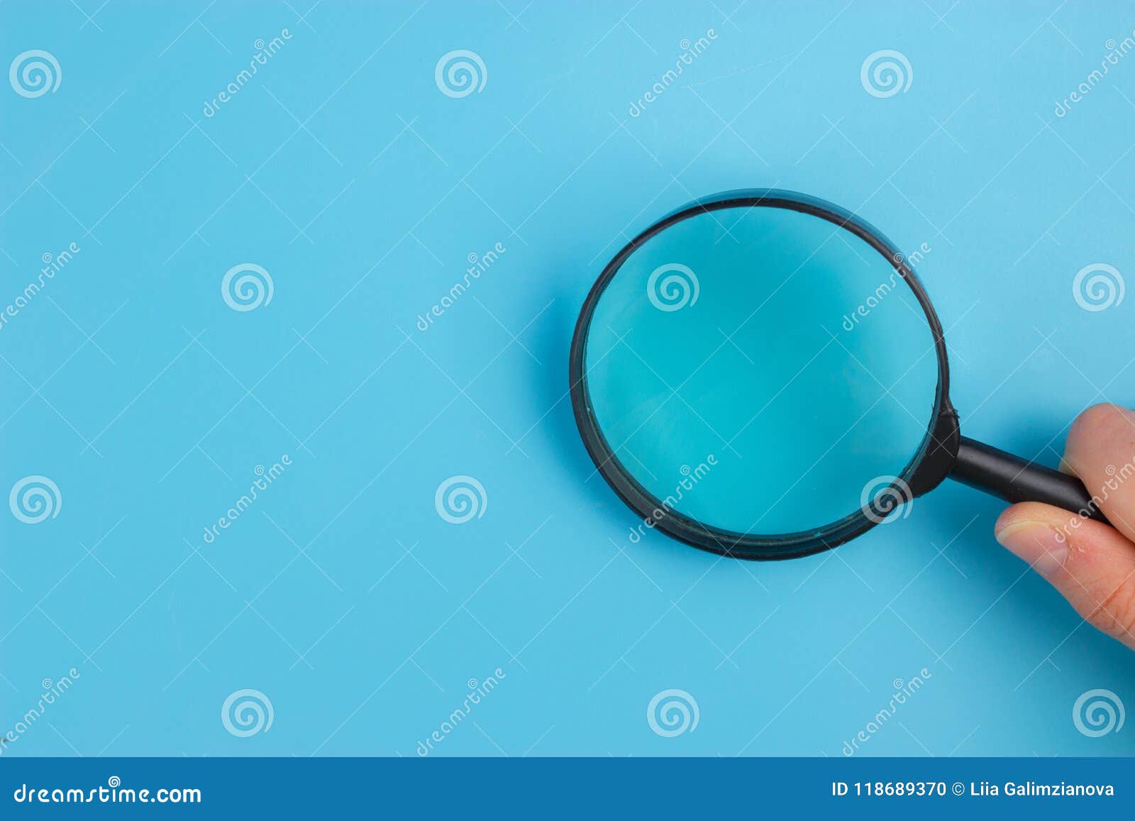 Magnifying Glass on Blue Background Stock Photo - Image of optical ...