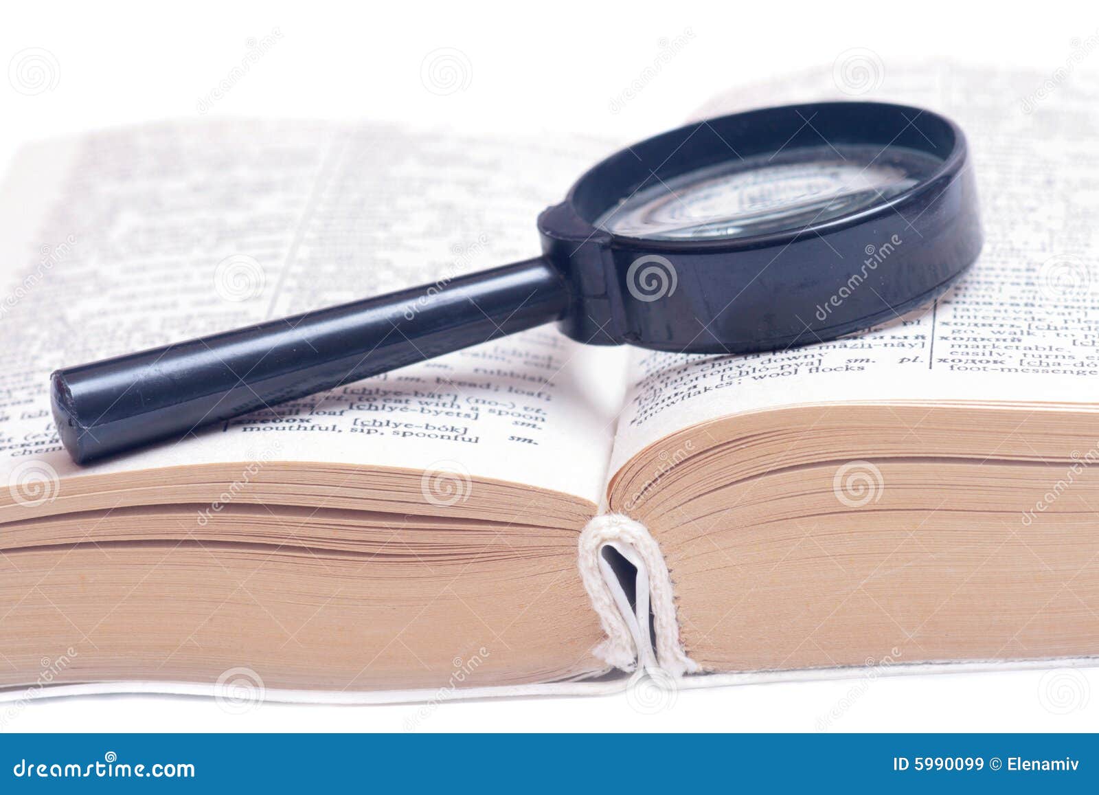 Magnifying Glass on a Book. Stock Image - Image of macro, focus: 5990099