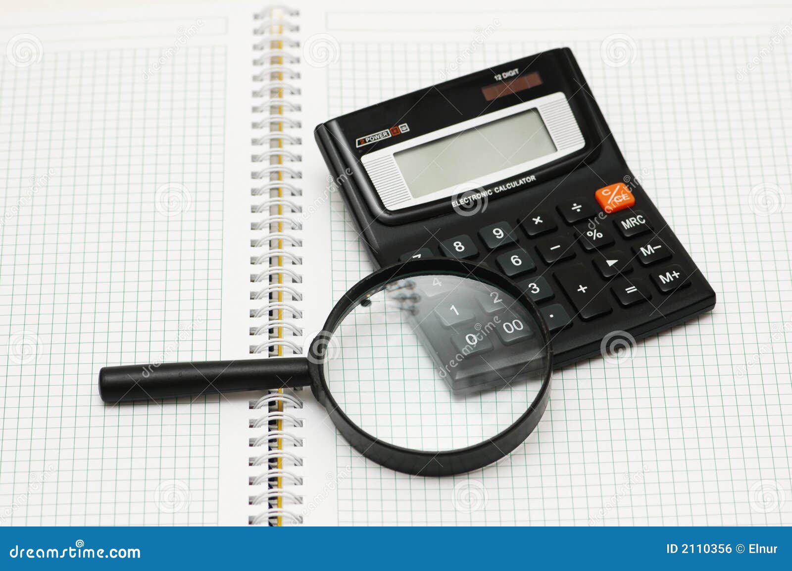 Magnifying Glass and Calculator on the Notebook Stock Photo - Image of ...