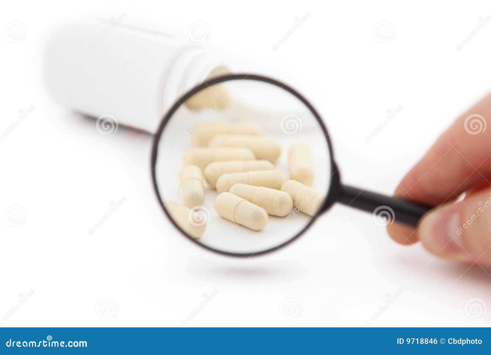 Magnifying Glass and Capsules Stock Photo - Image of glass, close: 9718846