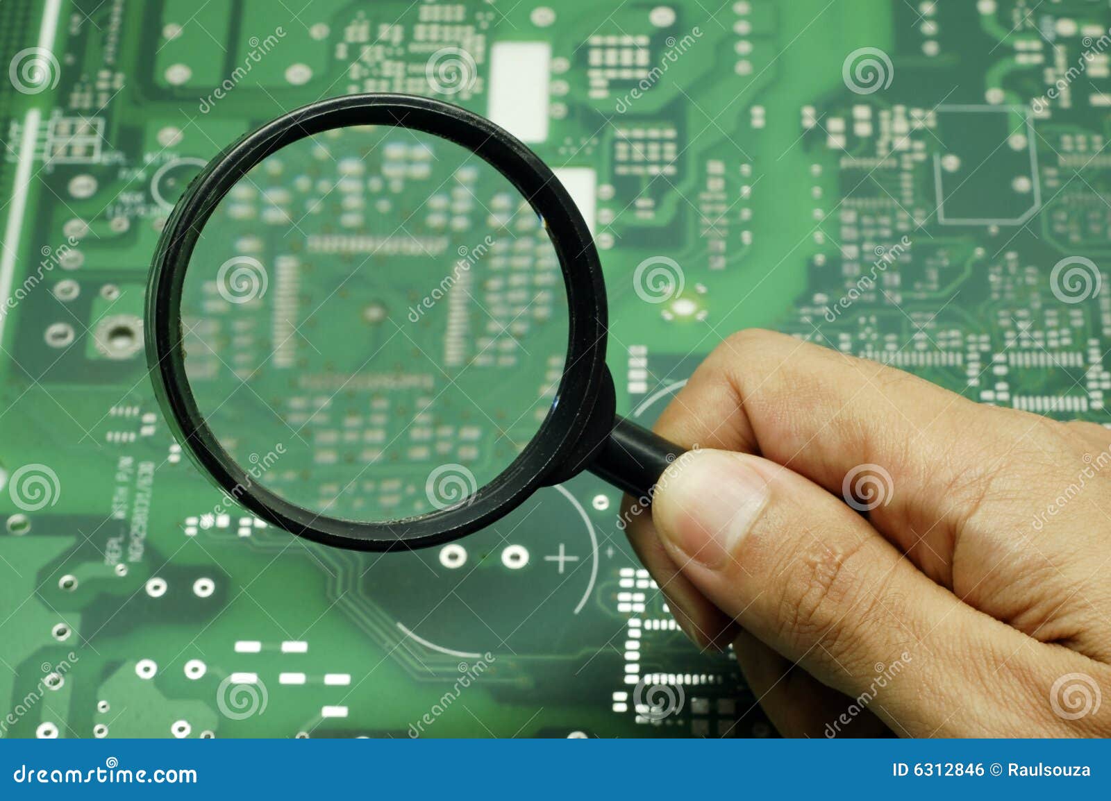 Magnifying Glass on a Circuit Stock Photo - Image of chip, hand: 6312846
