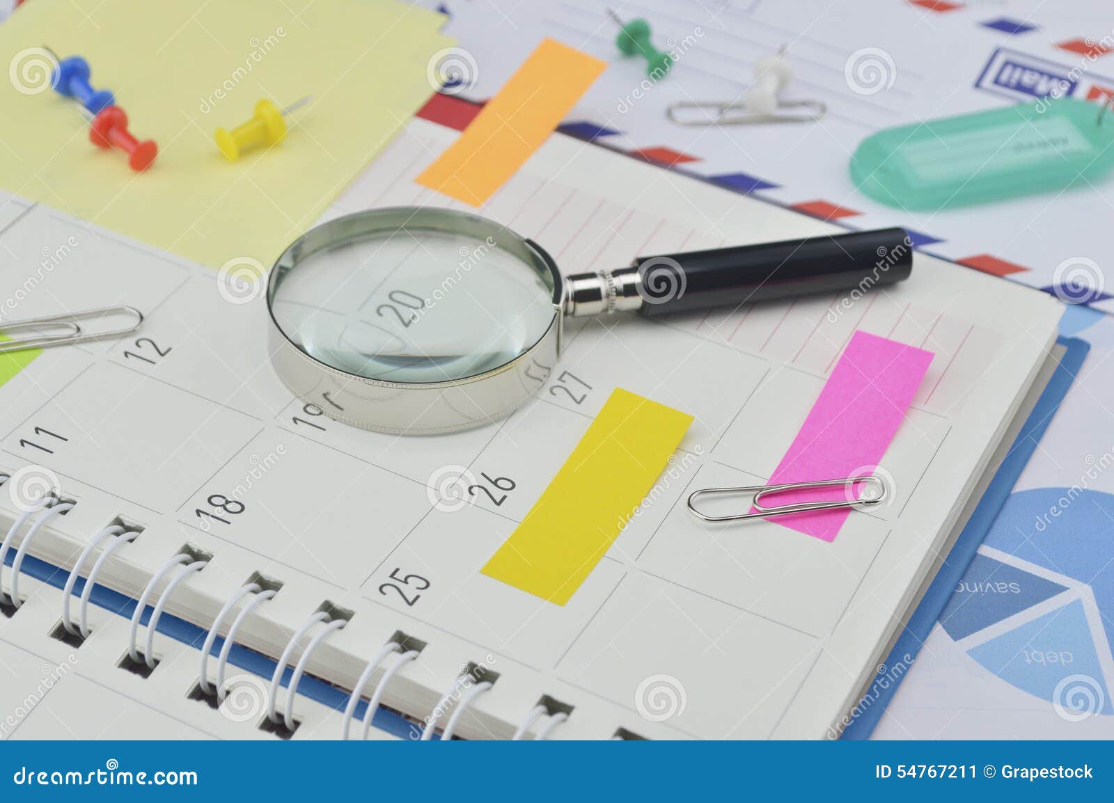 Magnifying Glass with Colorful Post it Notes and Pin on Diary Pa Stock ...
