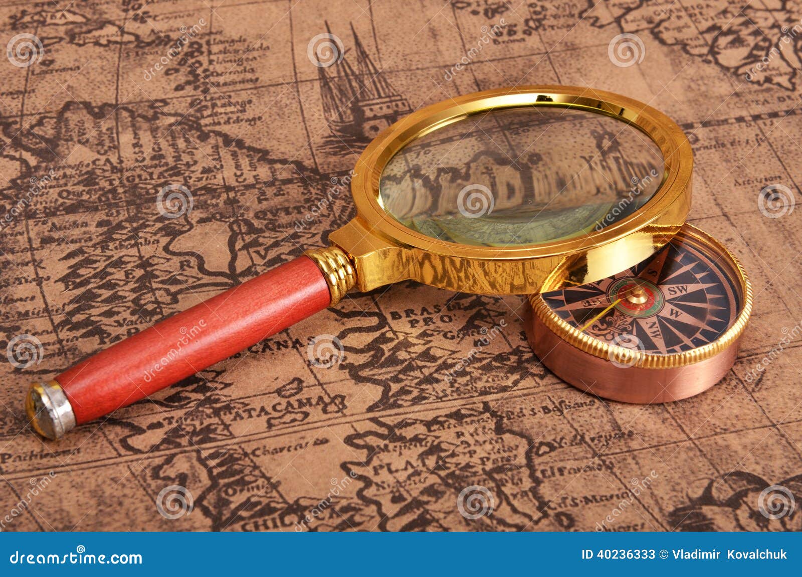 Magnifying Glass and Compass on the Ancient Map Stock Image - Image of ...